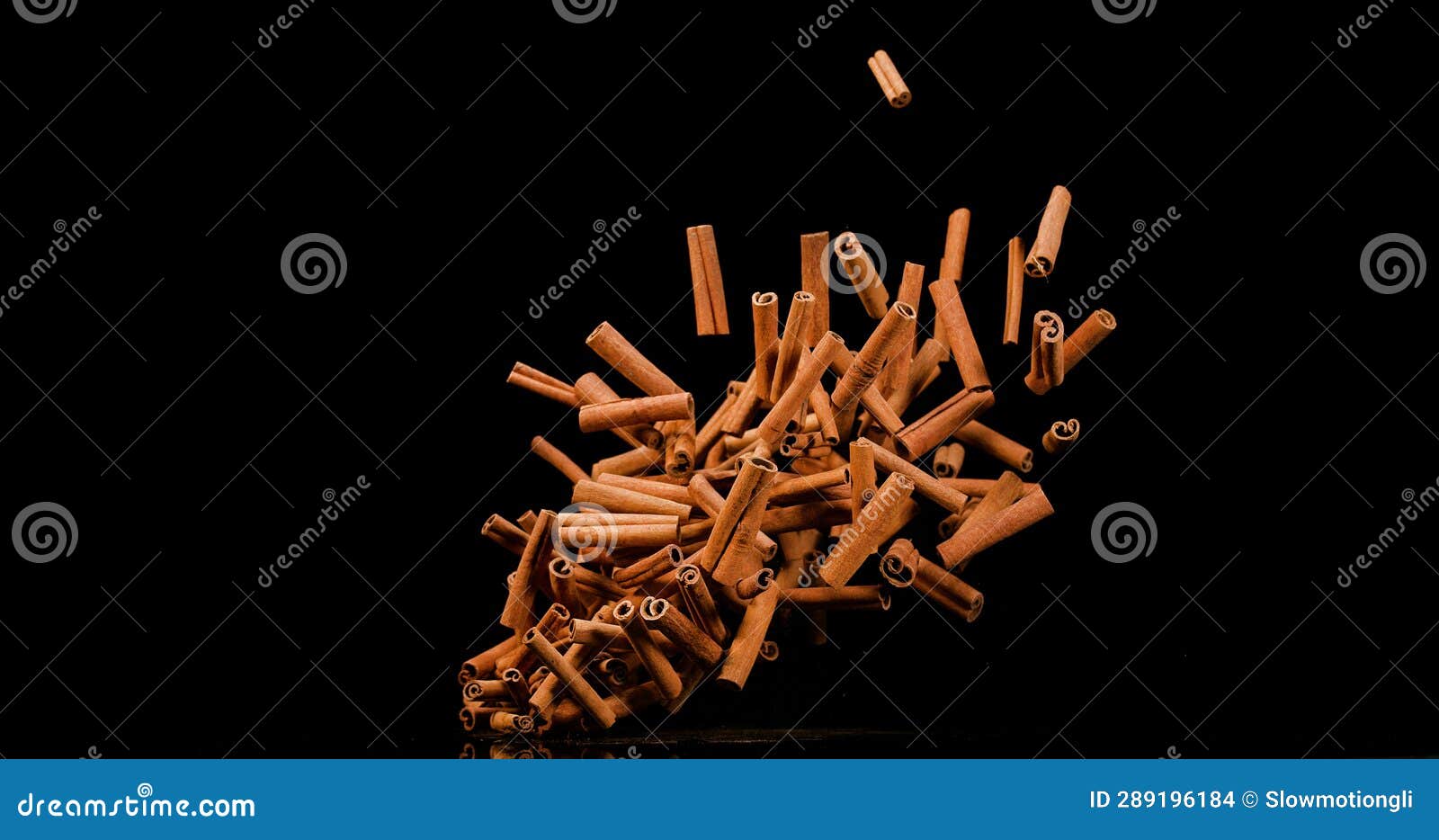 Cinnamon Sticks, Cinnamomum Zeylanicum, Spice Falling Against Black ...