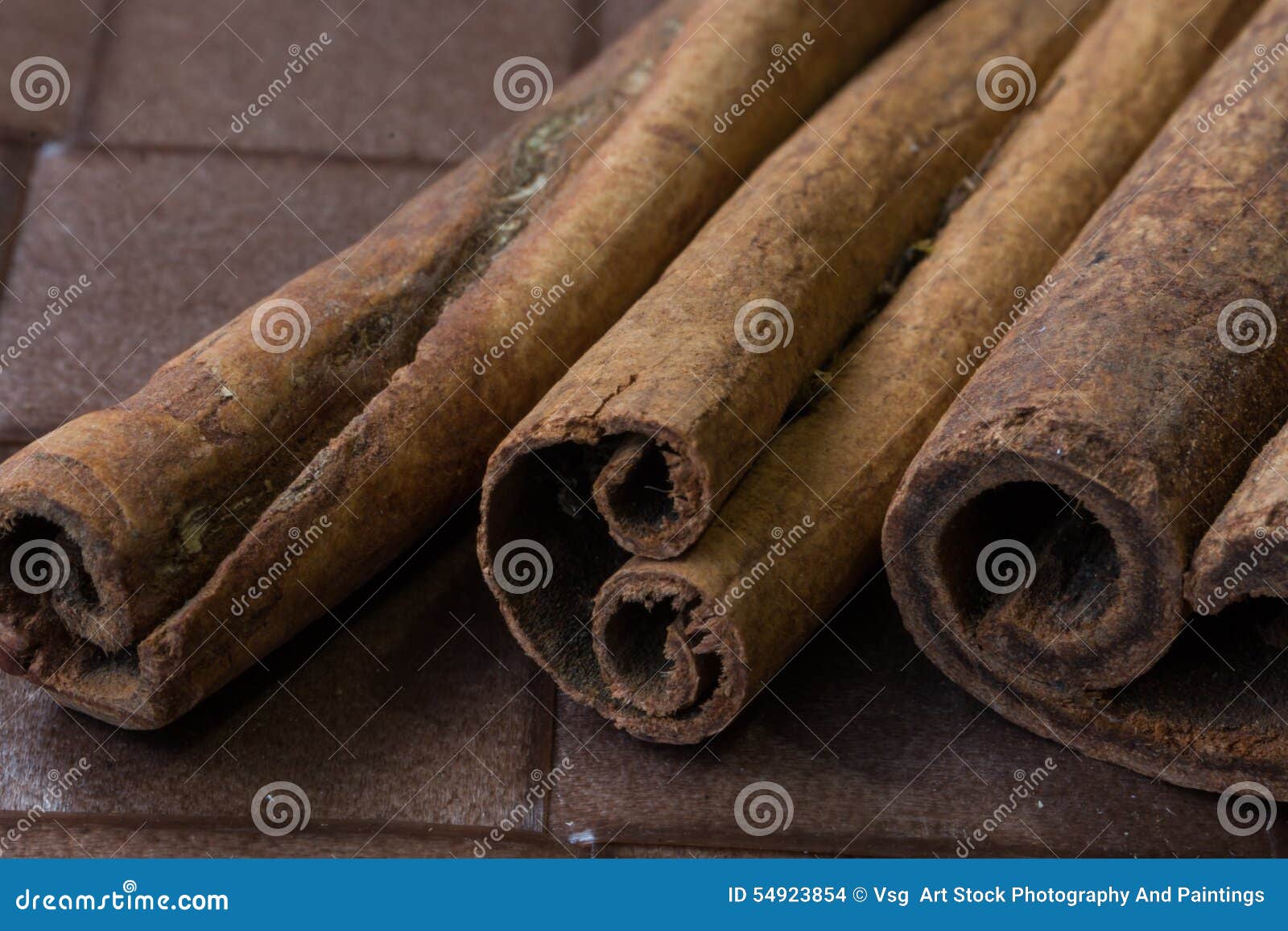 Cinnamon Sticks Close-up on Brown Background Stock Photo - Image of ...