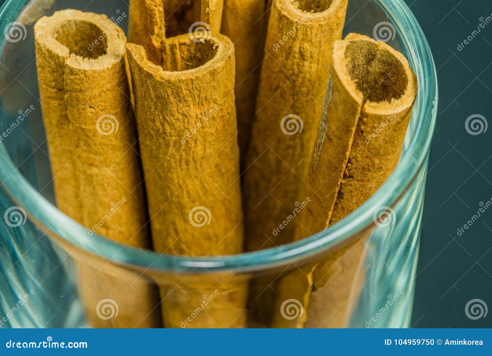 Cinnamon sticks in a glass stock photo. Image of cutting - 104959750