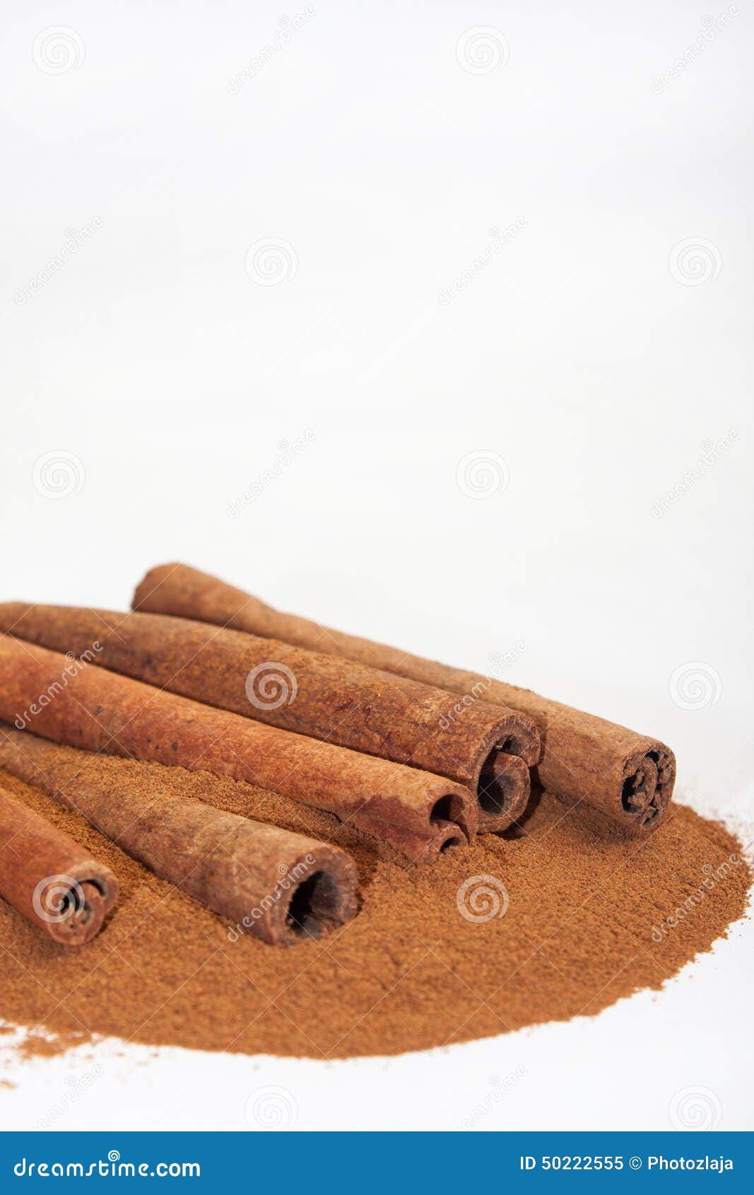 Cinnamon Sticks in a Pile of Ground Cinnamon Stock Image - Image of ...