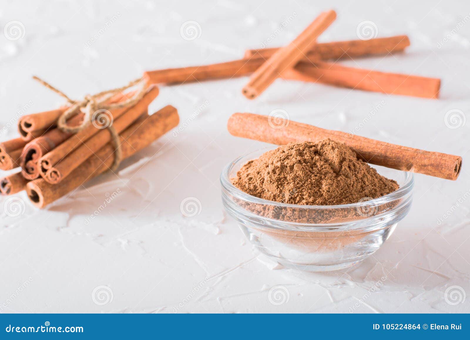 Cinnamon Sticks, Tied with a Rope, and Ground Cinnamon in a Bowl Stock ...
