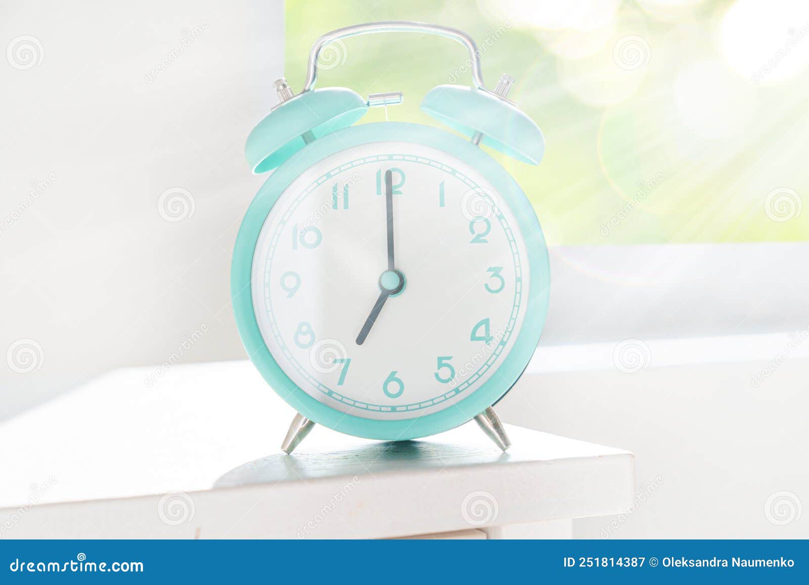 Circadian Rhythms Concept - Alarm Clock Set on 7 am with Sun Rays Stock ...