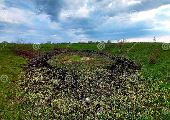 Circle of ash on field. stock photo. Image of unusual - 211654280