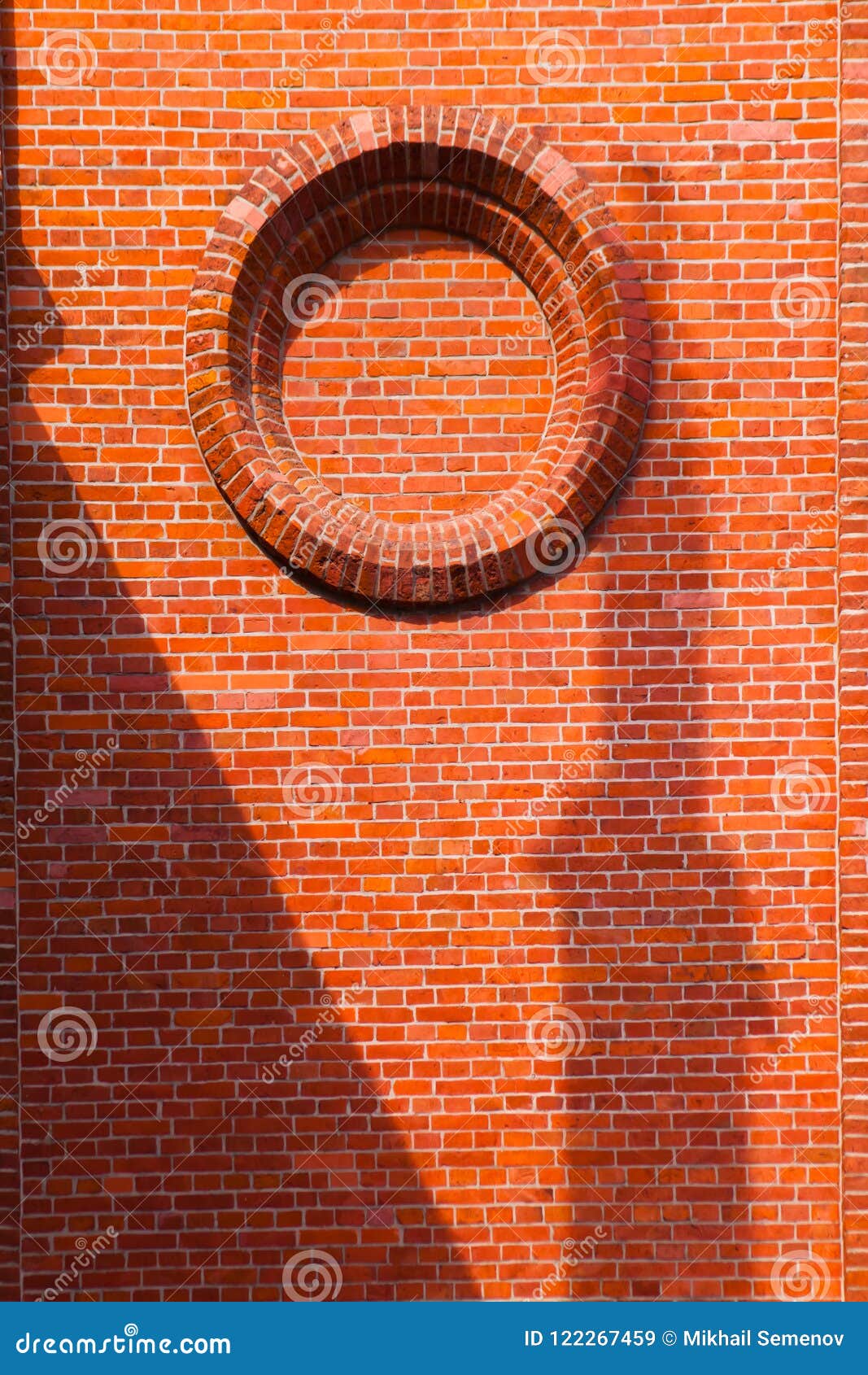 Circle on a brick wall, stock image. Image of black - 122267459
