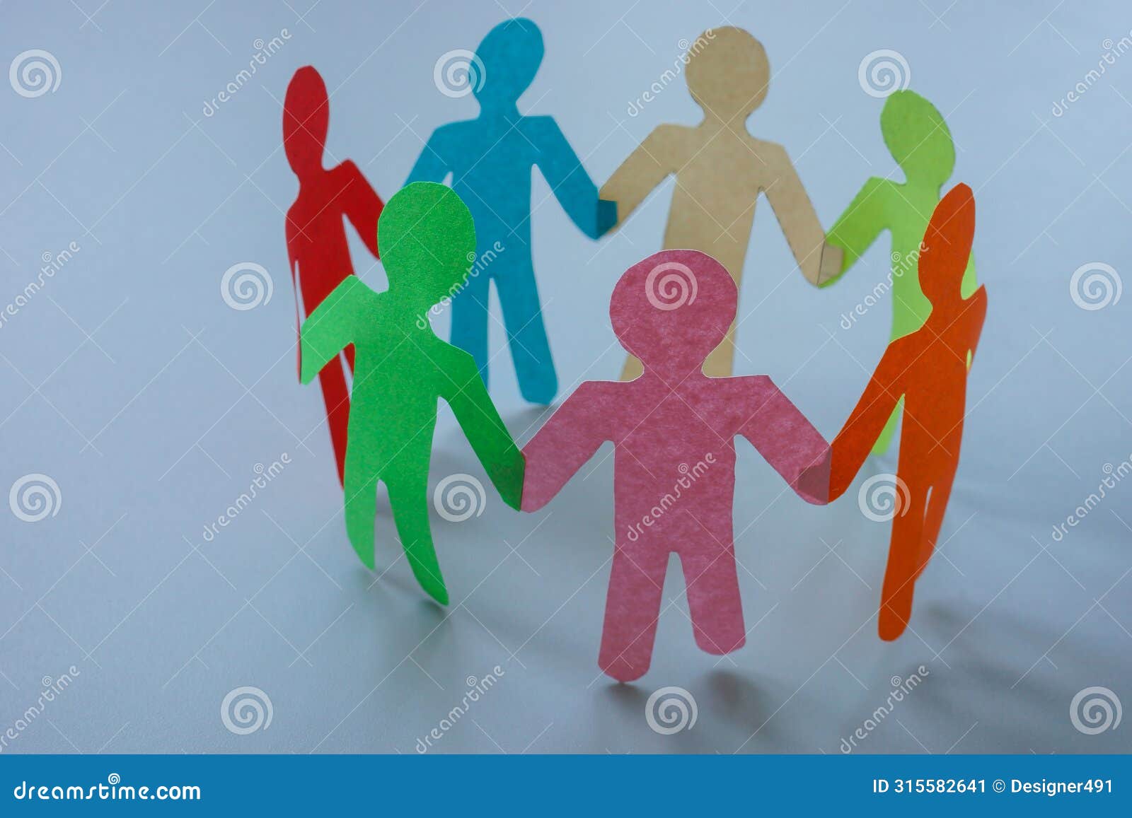 Unity In Diversity: Inclusive Paper Chain Of Cutout People Stock Photo ...