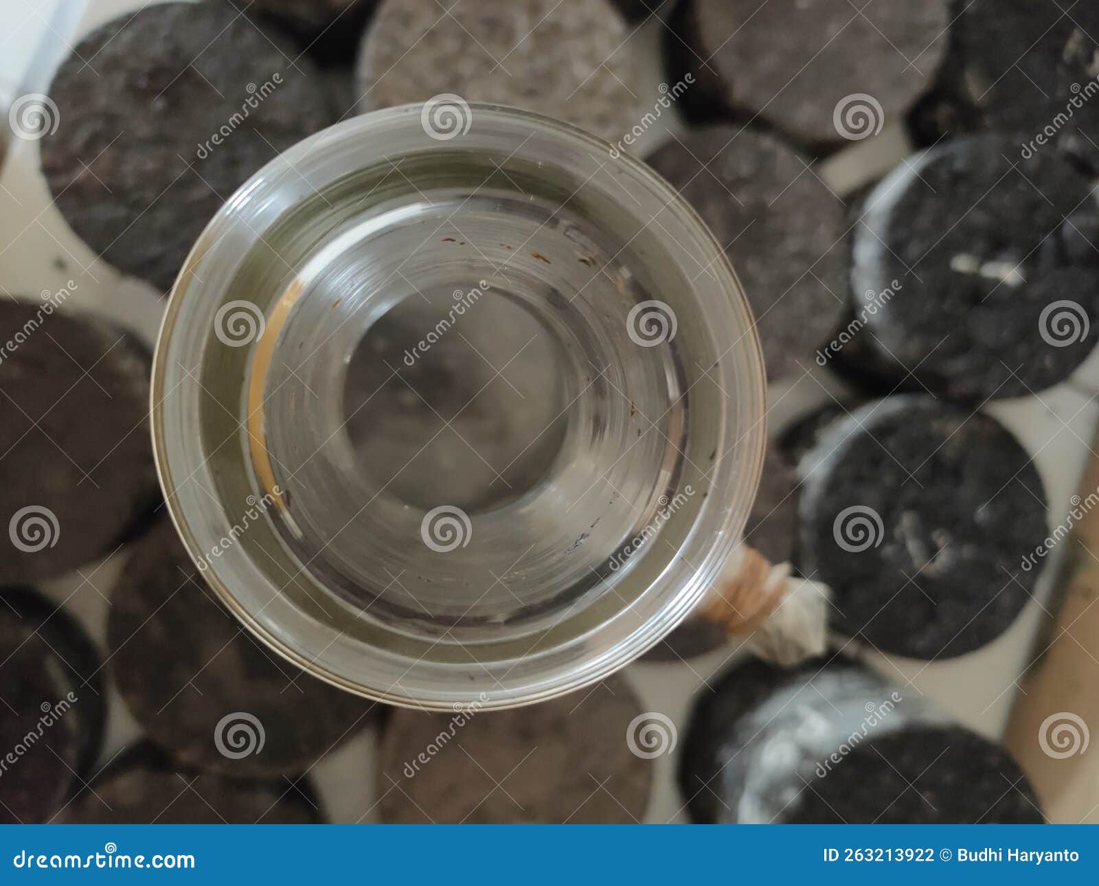 A Circle of Glass Bottles that ACTS As a Measure of Liquid Stock Photo ...
