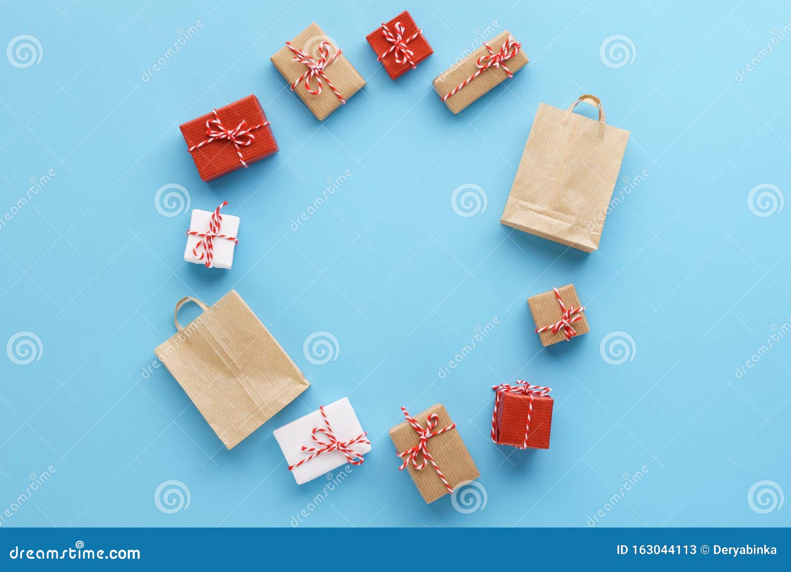 Circle Made of Gift Boxes and Shopping Bags on Blue Background Stock ...