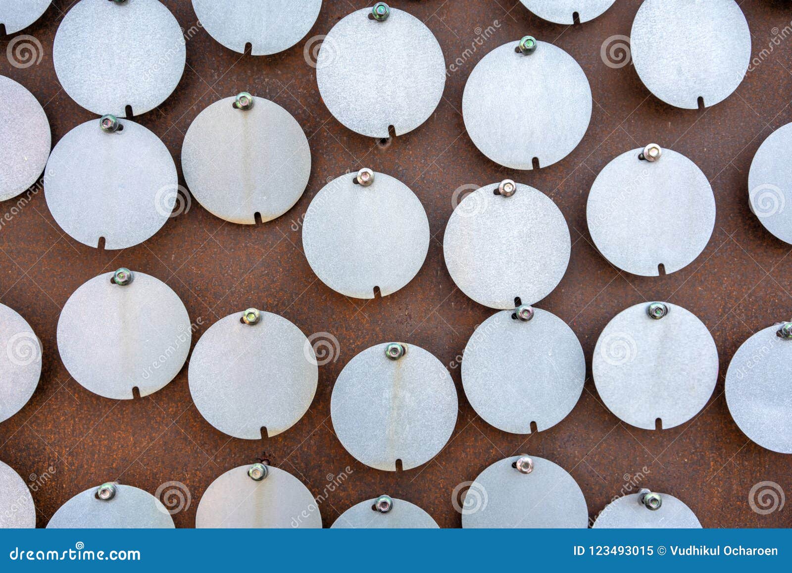 Circle Metal Sheets Installed on Rusty Metal Wall for Decoration Stock ...