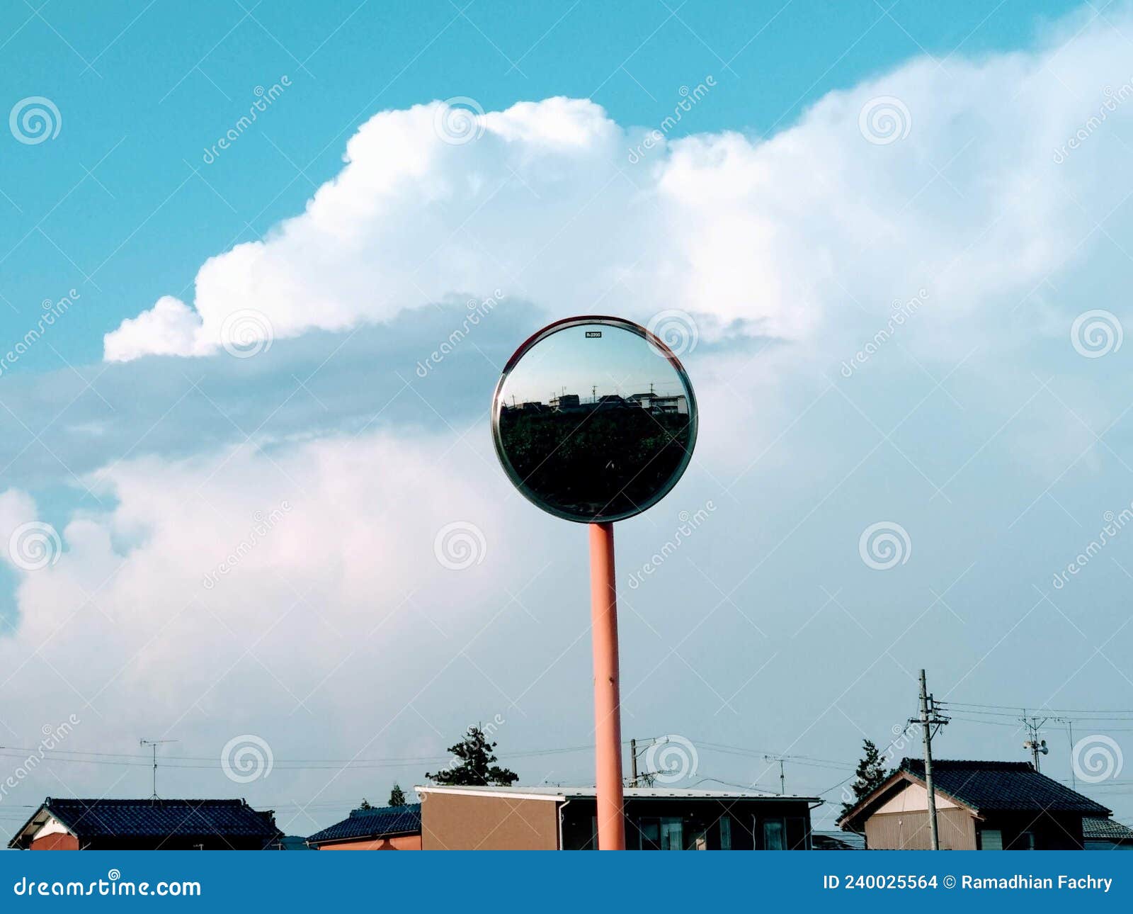 A Circle Mirror Standing Straightly in the Sky Stock Photo - Image of ...