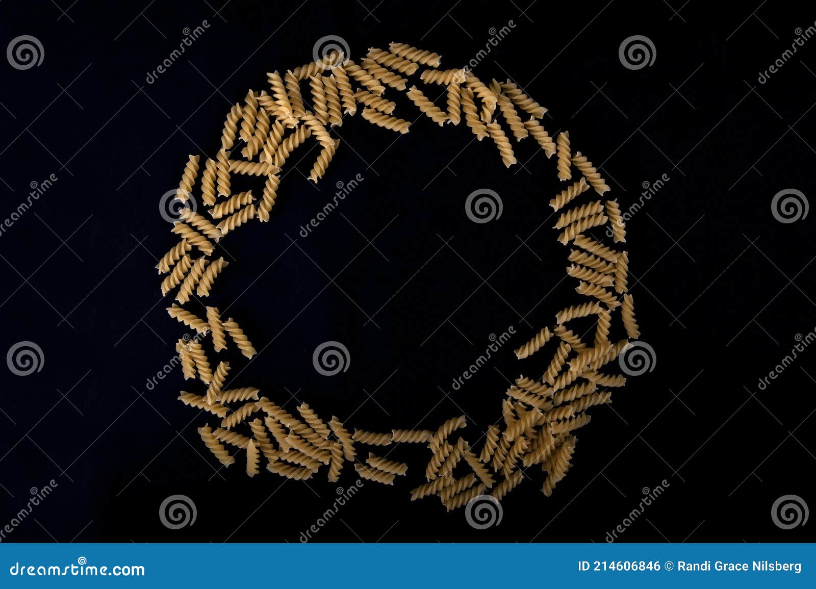 Circle of Pasta Screws stock photo. Image of cuisine - 214606846