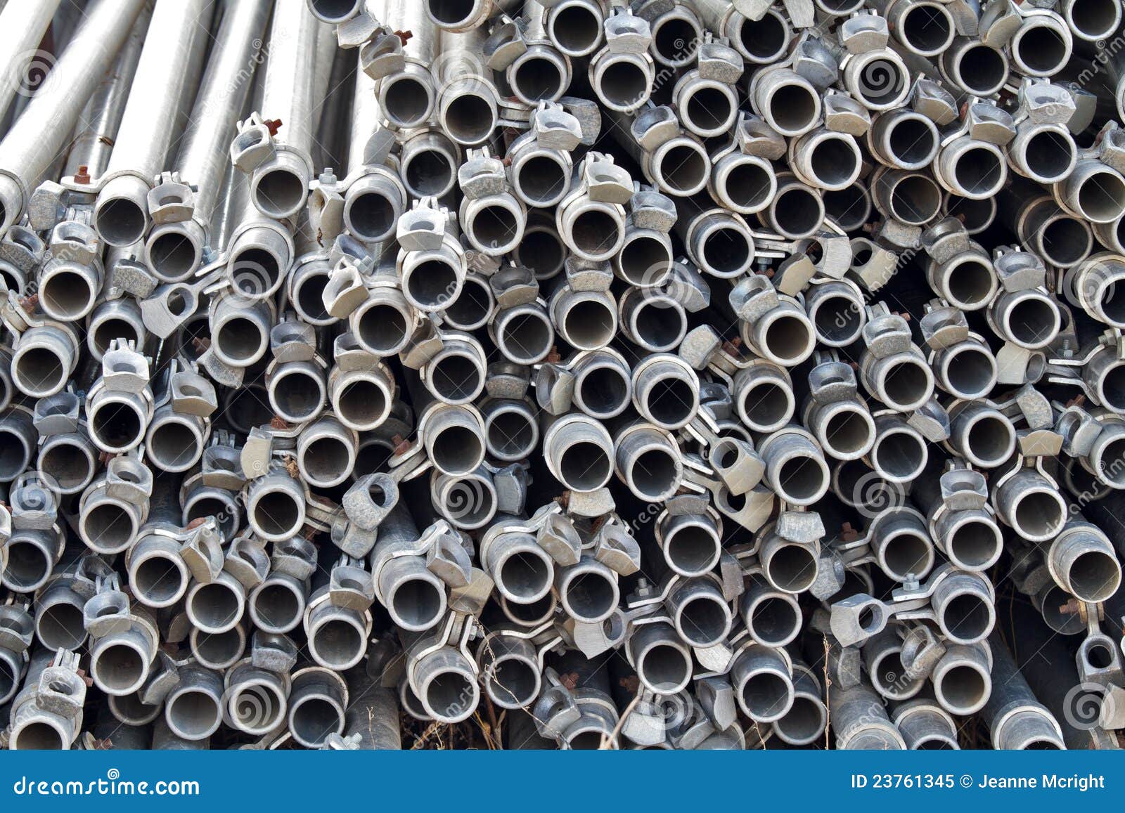 Circle Patterns in Stacked Metal Pipes Stock Image - Image of pile ...