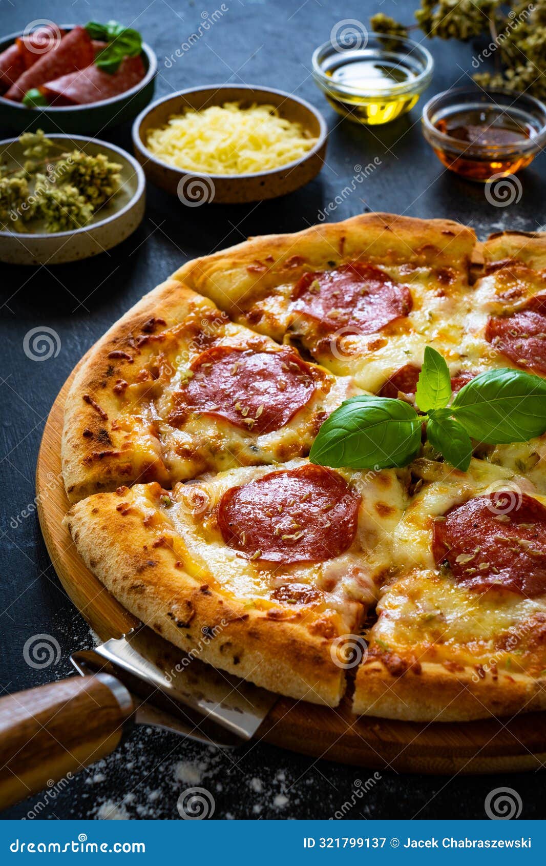Circle Pepperoni Pizza with Mozzarella Cheese on Black Wooden Table ...