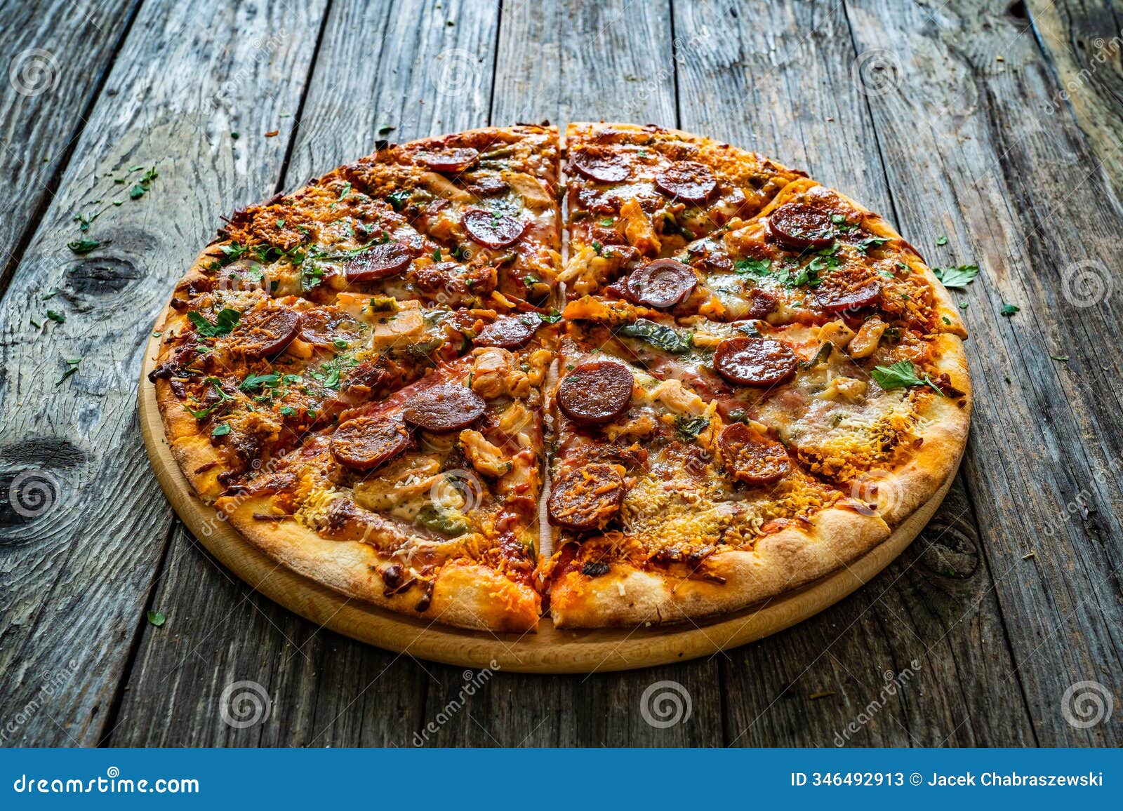 Circle Pizza Chorizo with Chicken Nuggets and Mozzarella, on Wooden ...