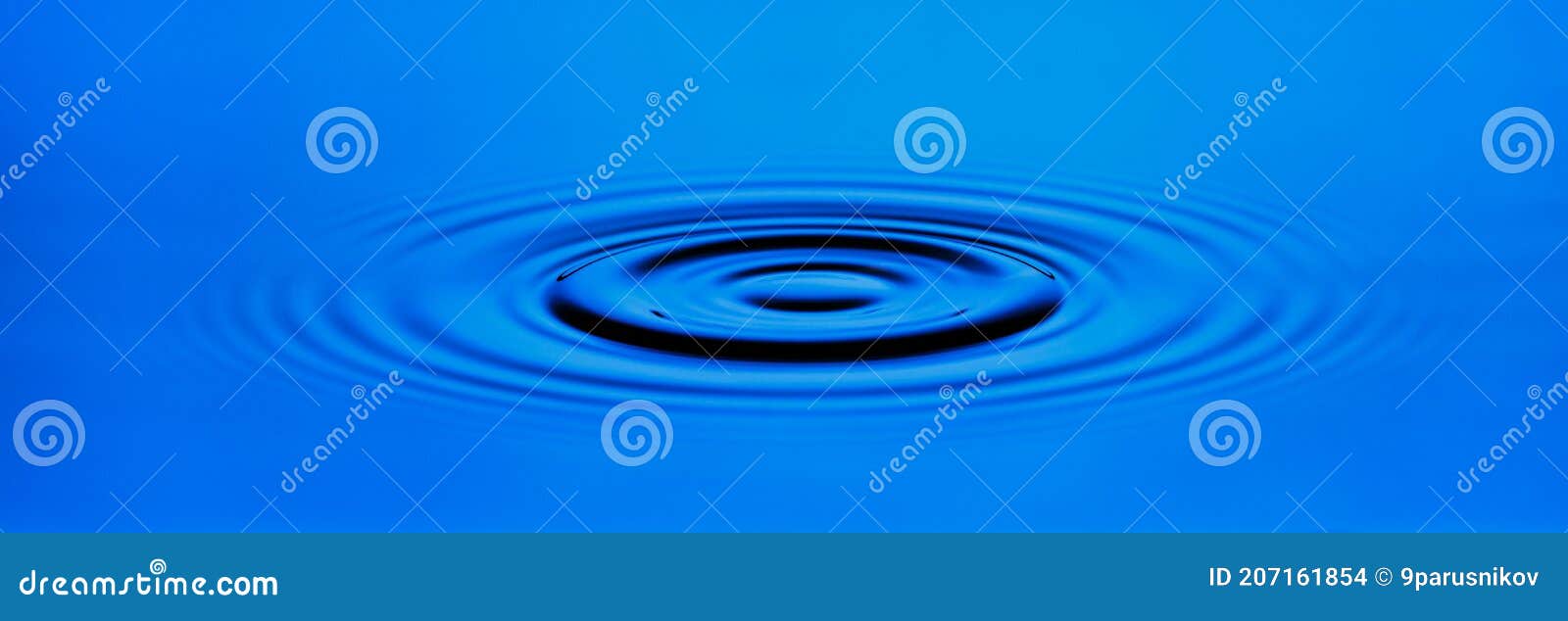 The Circle Ripple of the Surface of the Blue Water. Stock Photo - Image ...