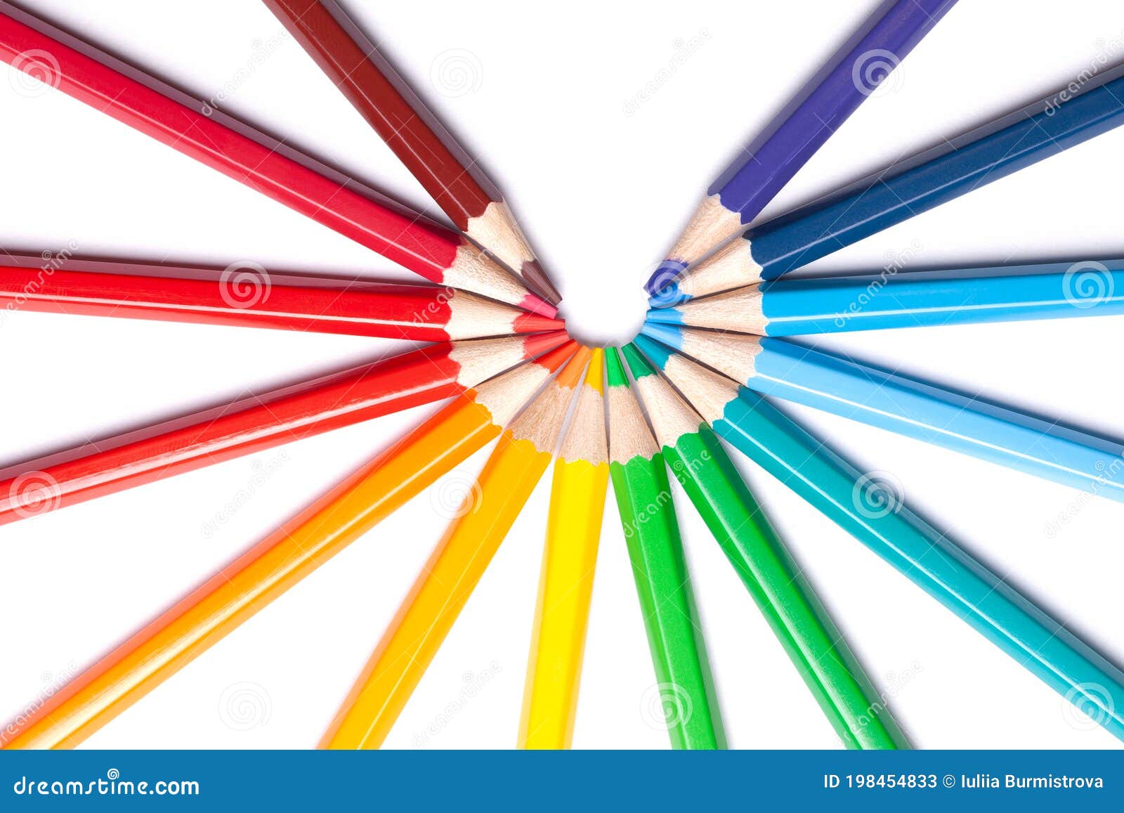 Circle or Semicircle of Colored Sharp Pencils Spouts in the Center on a ...
