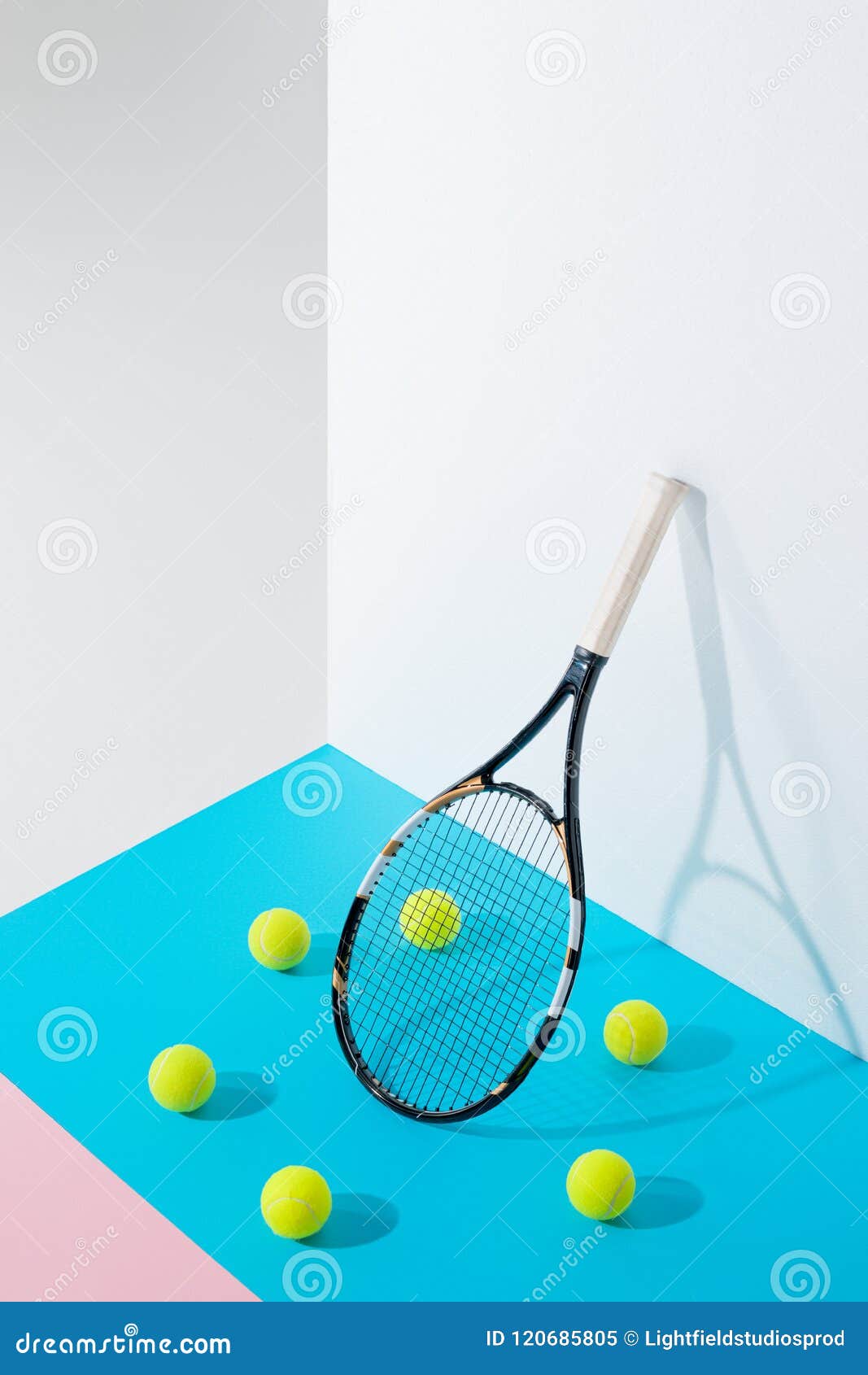 Circle of Tennis Balls on Blue Around Tennis Racket Stock Image - Image ...