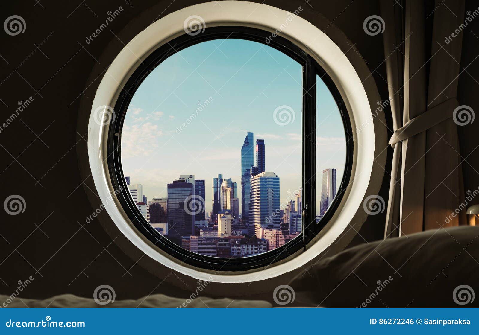 Circle Window with Modern Buildings in the City at Morning Stock Photo ...