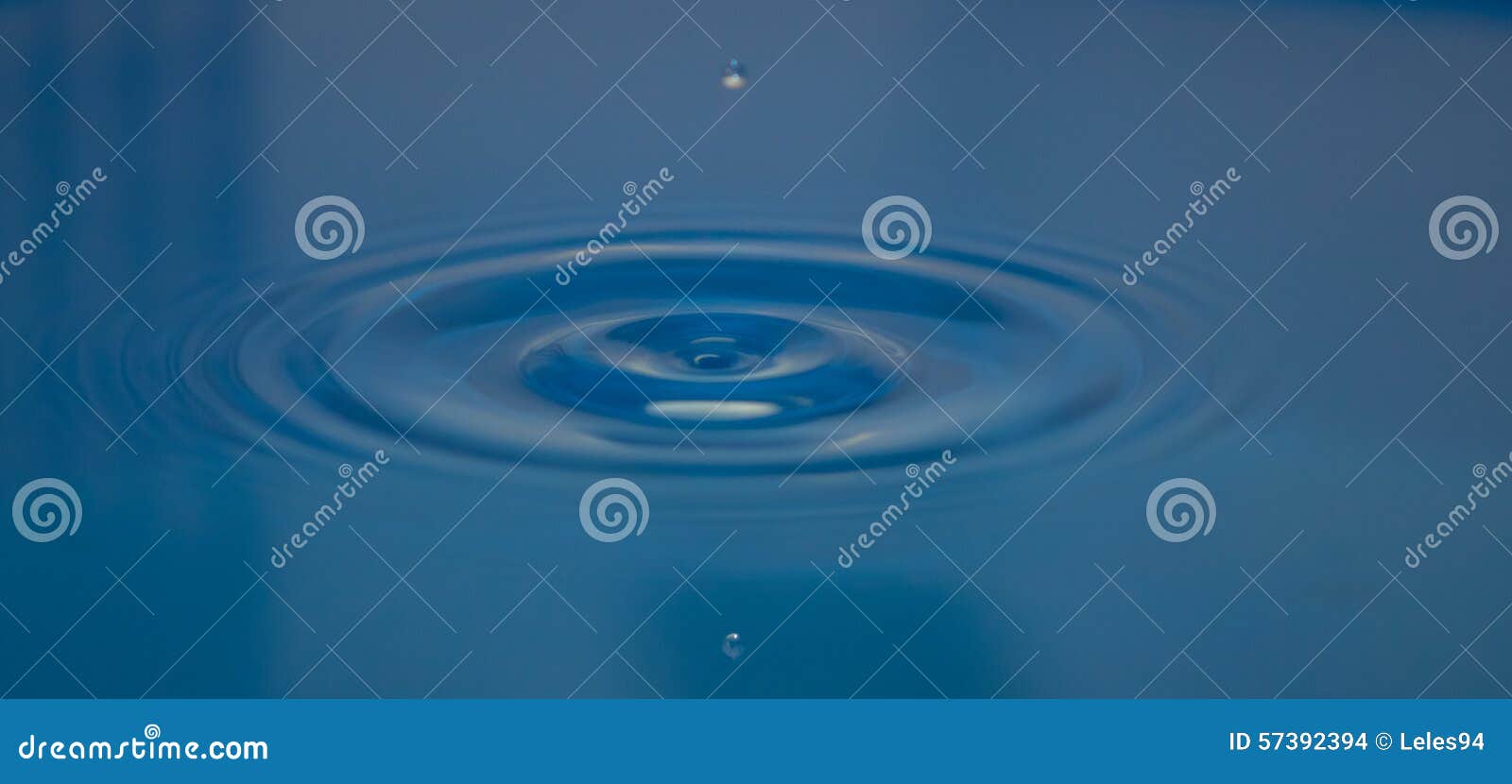 Circles of water drop stock photo. Image of reflection - 57392394