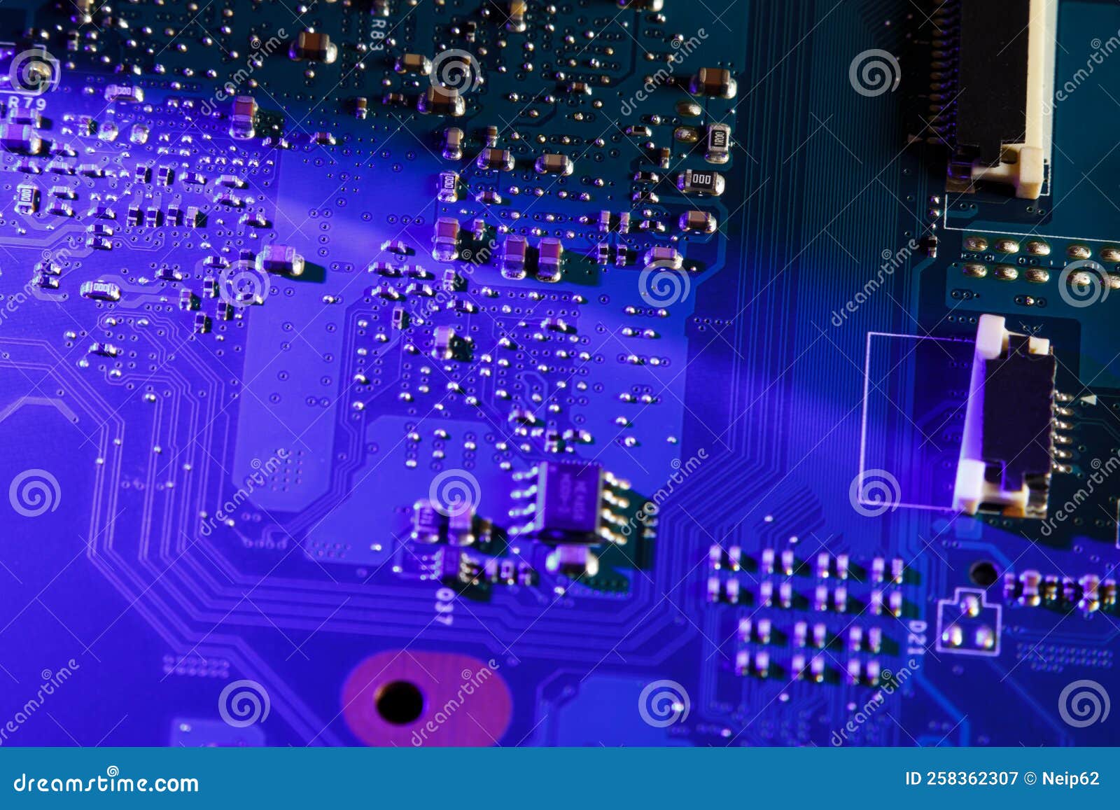 Circuit Board Close-up. Electronic Circuit Board is Illuminated in Blue ...