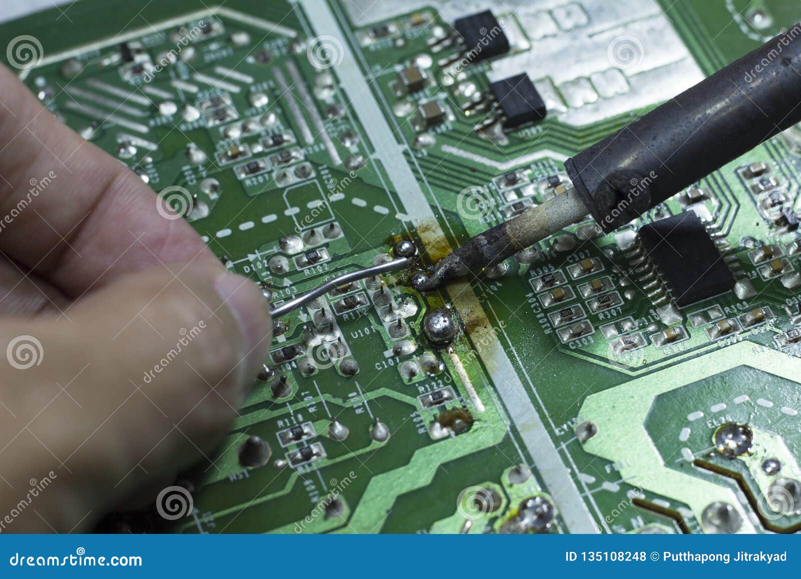 Electronic Circuit Board and Soldering Iron and Hand Working Stock ...