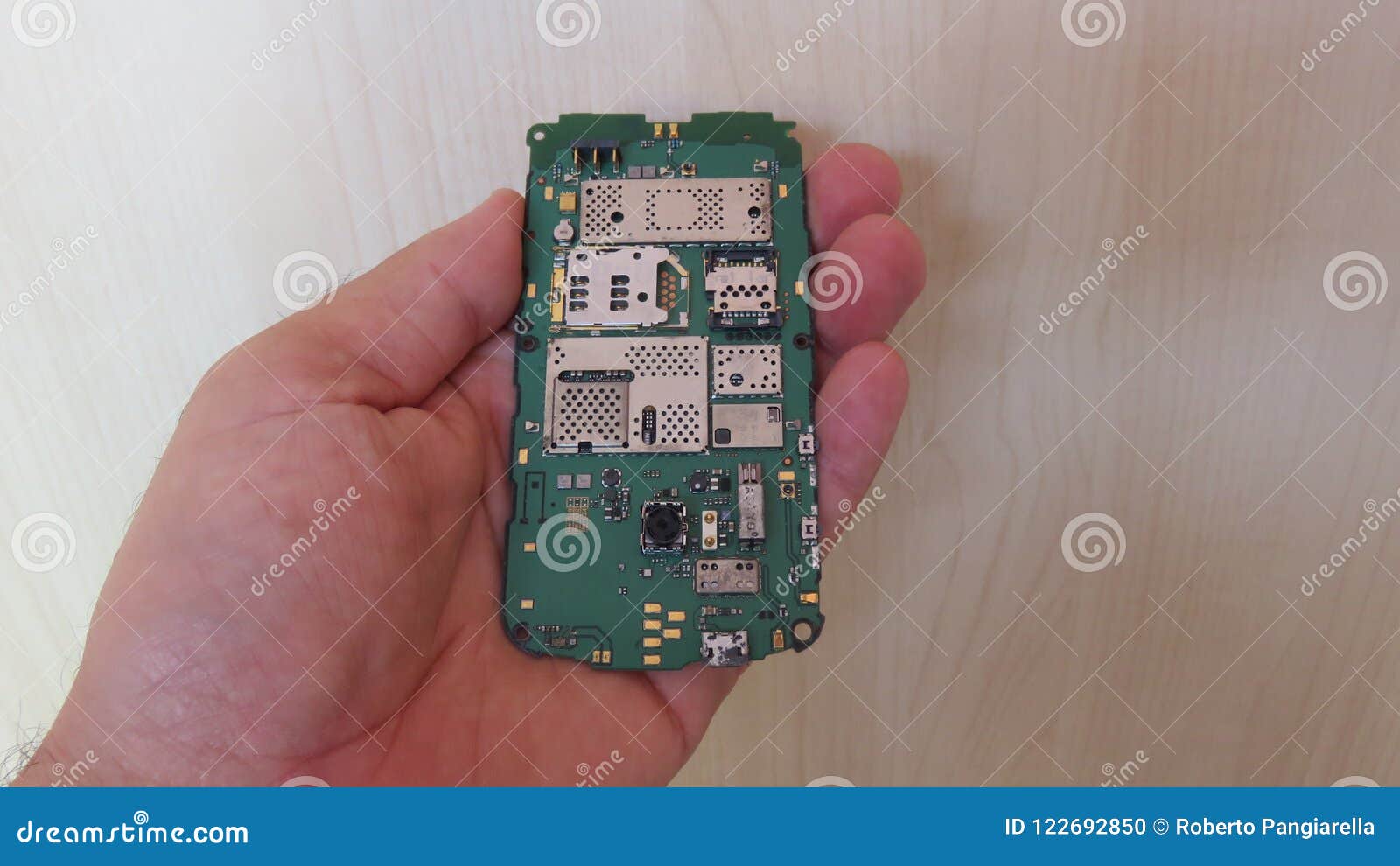 Circuit boards in hand stock photo. Image of component - 122692850