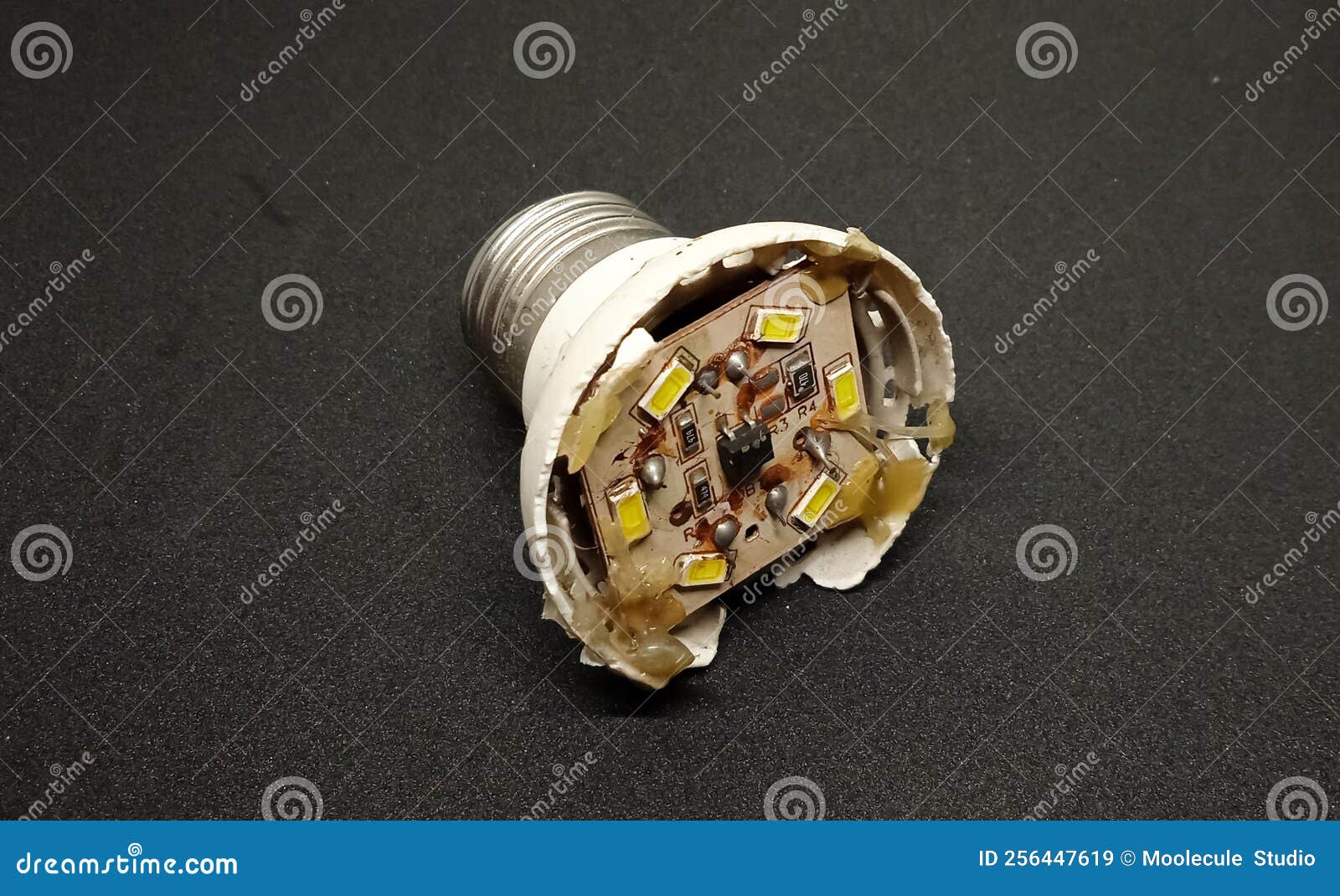 The Circuit Inside the Broken White LED Lamp, Isolated on Black ...