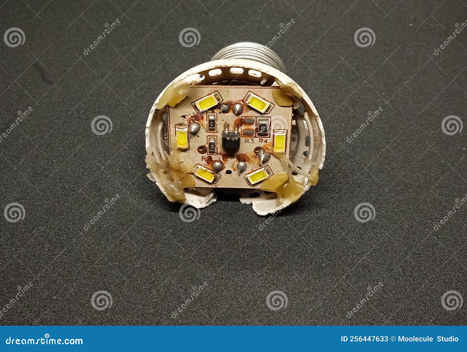 The Circuit Inside the Broken White LED Lamp, Isolated on Black ...