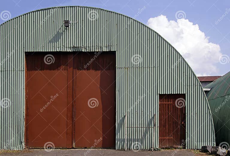 Circular Building with Two Large Doors during Daytime Stock Photo ...