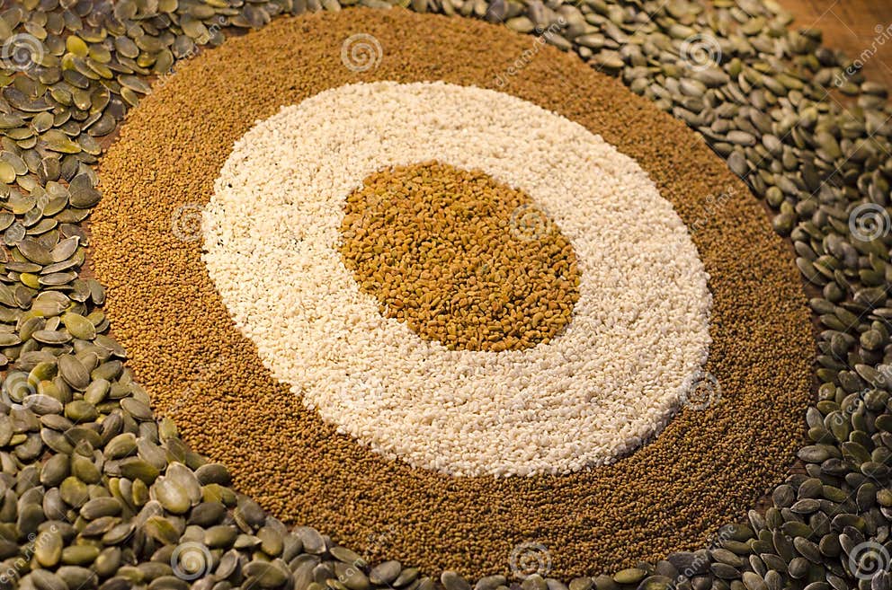 A Circular Bulls-eye Pattern of Seeds Stock Photo - Image of pattern ...