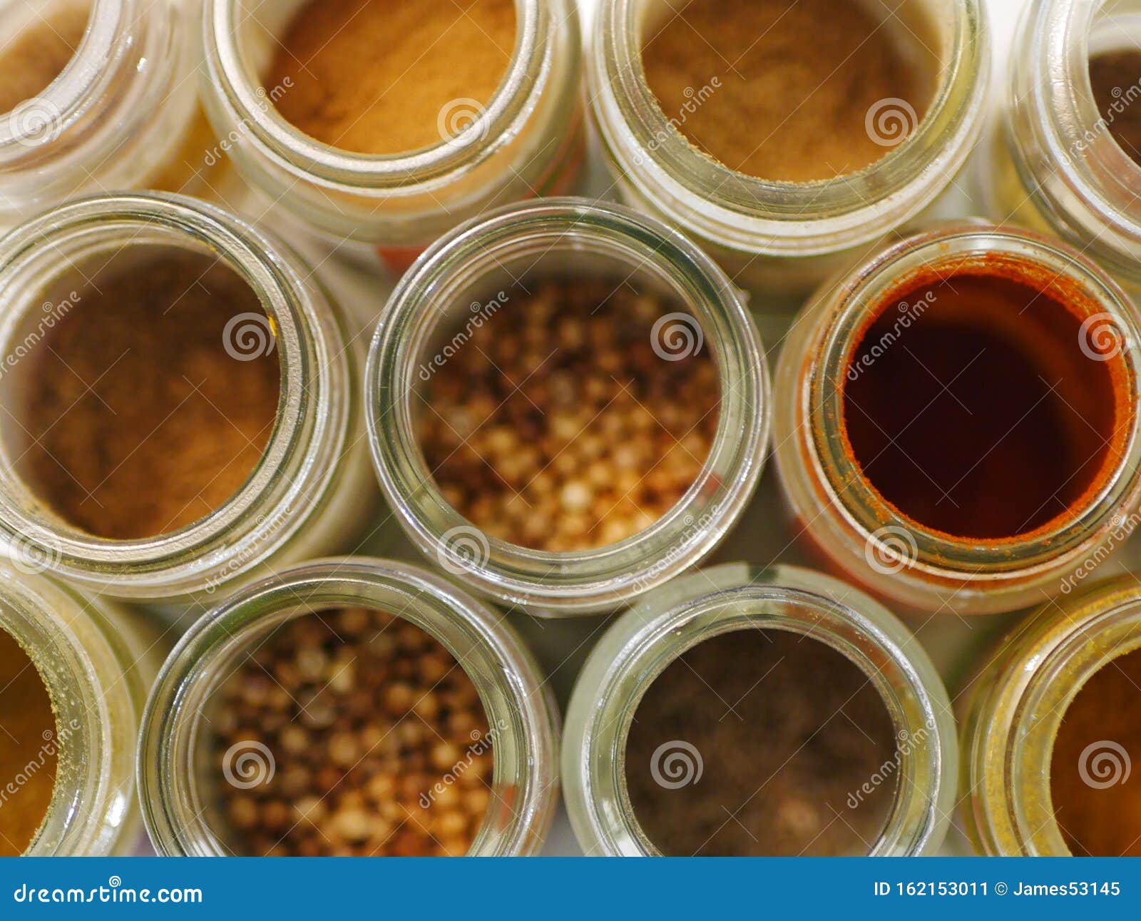 Circular Glass Spice Jars stock image. Image of tops - 162153011