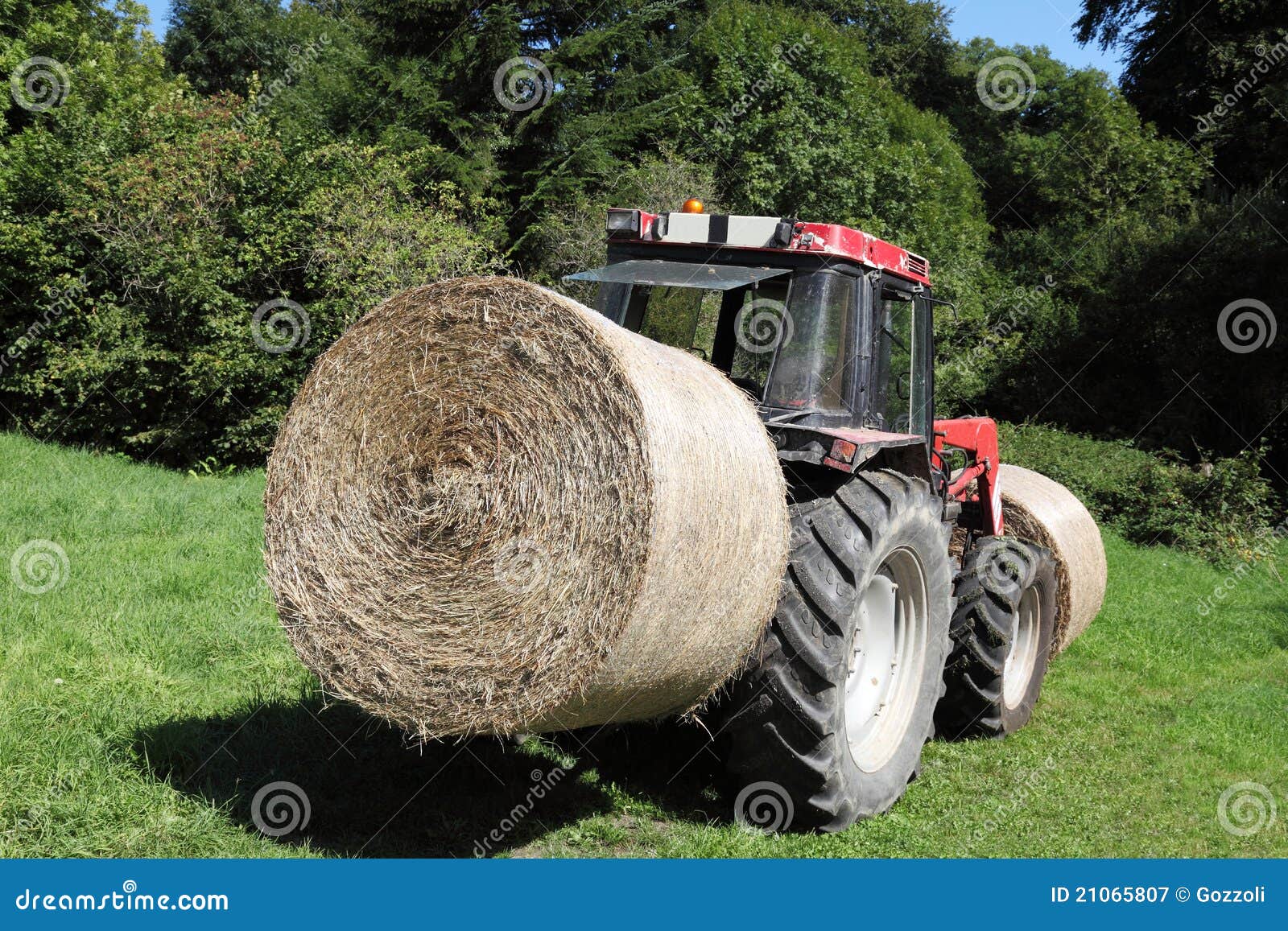 Circular Hay Bale on Rear of Tractor Stock Image - Image of bales, bale ...