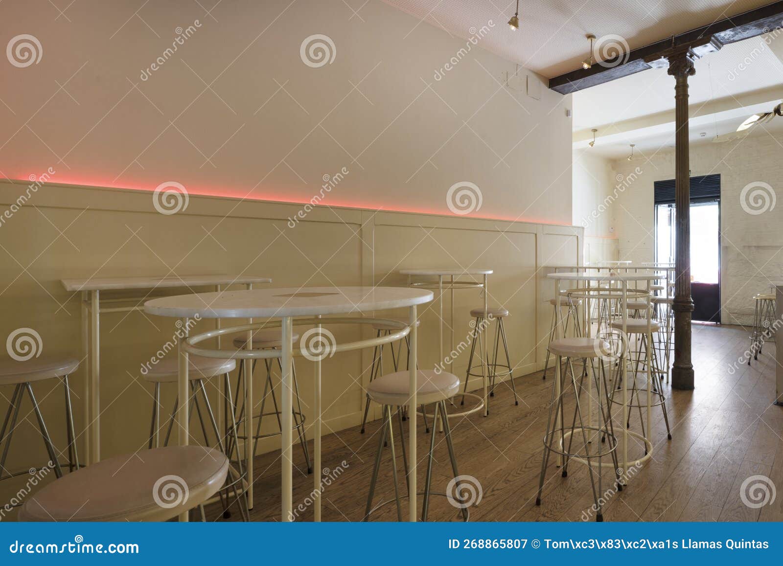 Circular High Tables with Matching Stools in a Restaurant Hall Stock ...
