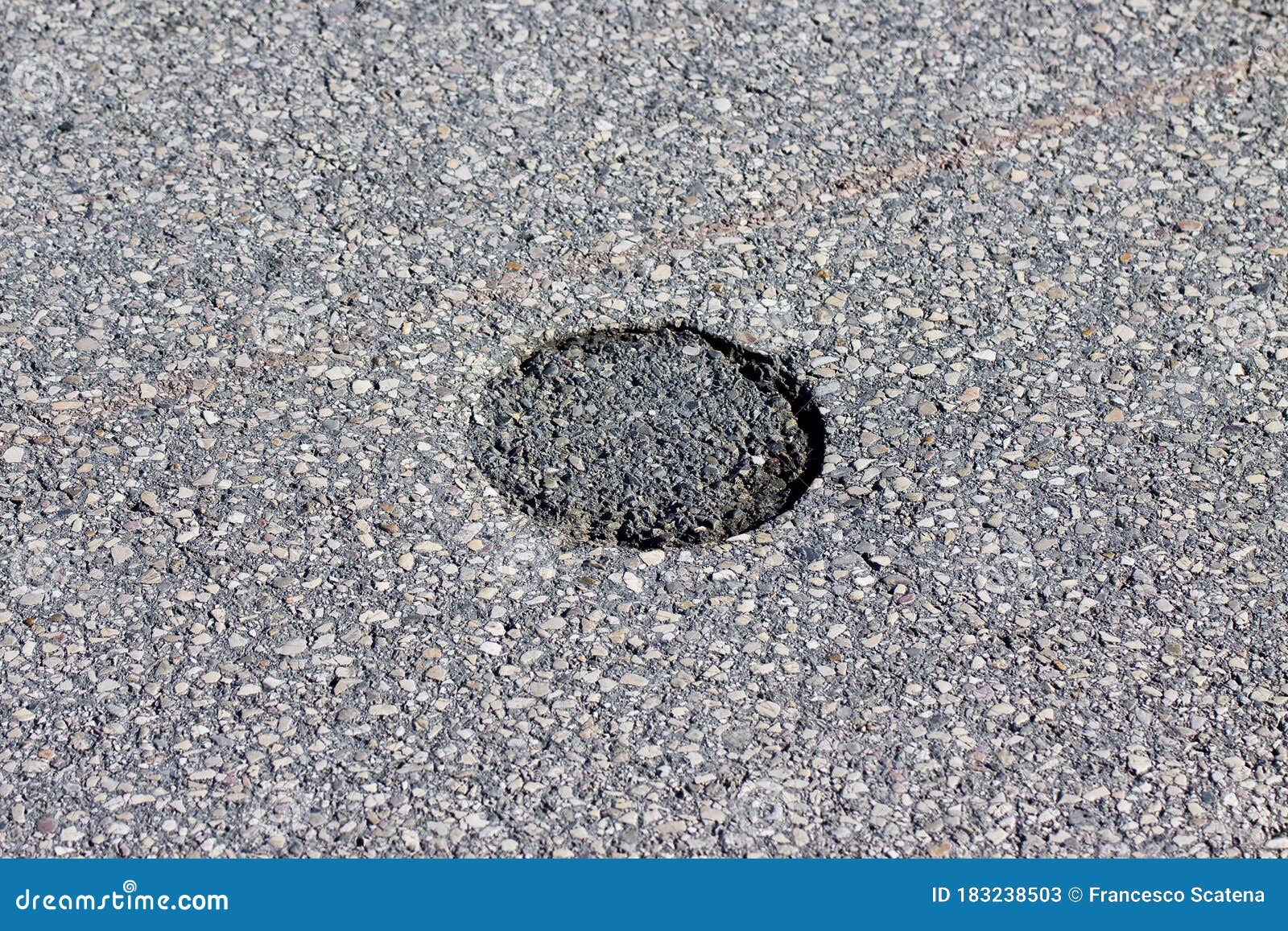 Circular Hole for Asphalt Quality Testing in a Asphalt Road Stock Image ...