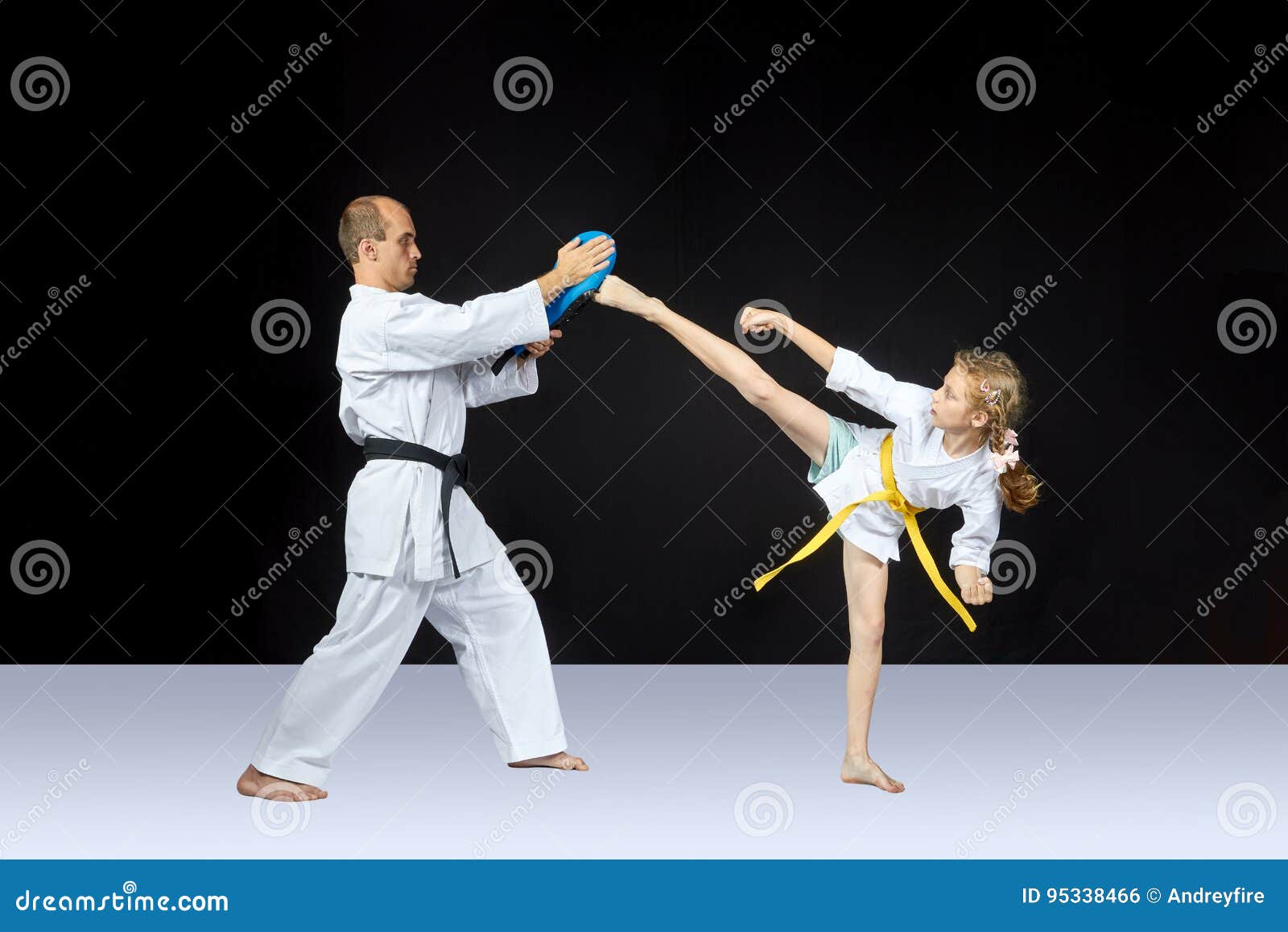 Circular Kick Kicking Girl is Beating on the Simulator Stock Photo ...