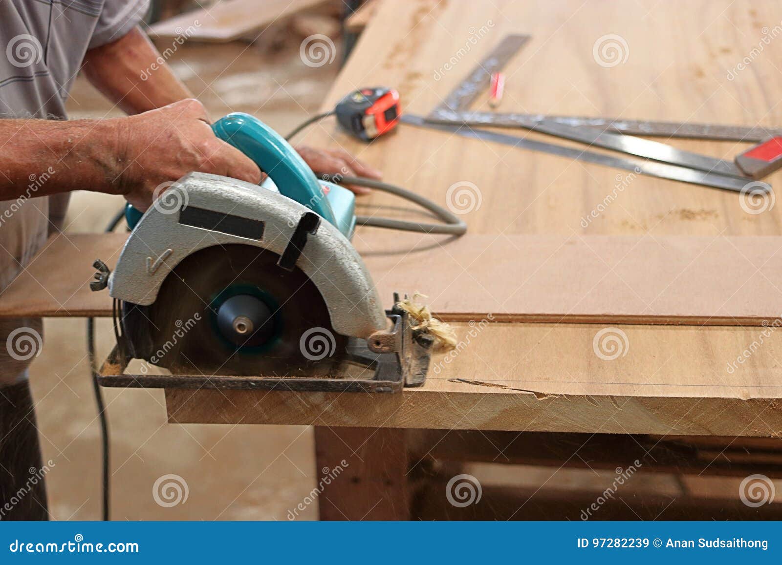 Circular Saw Cutting Piece of Wood in Carpentry Workshop Stock Image ...