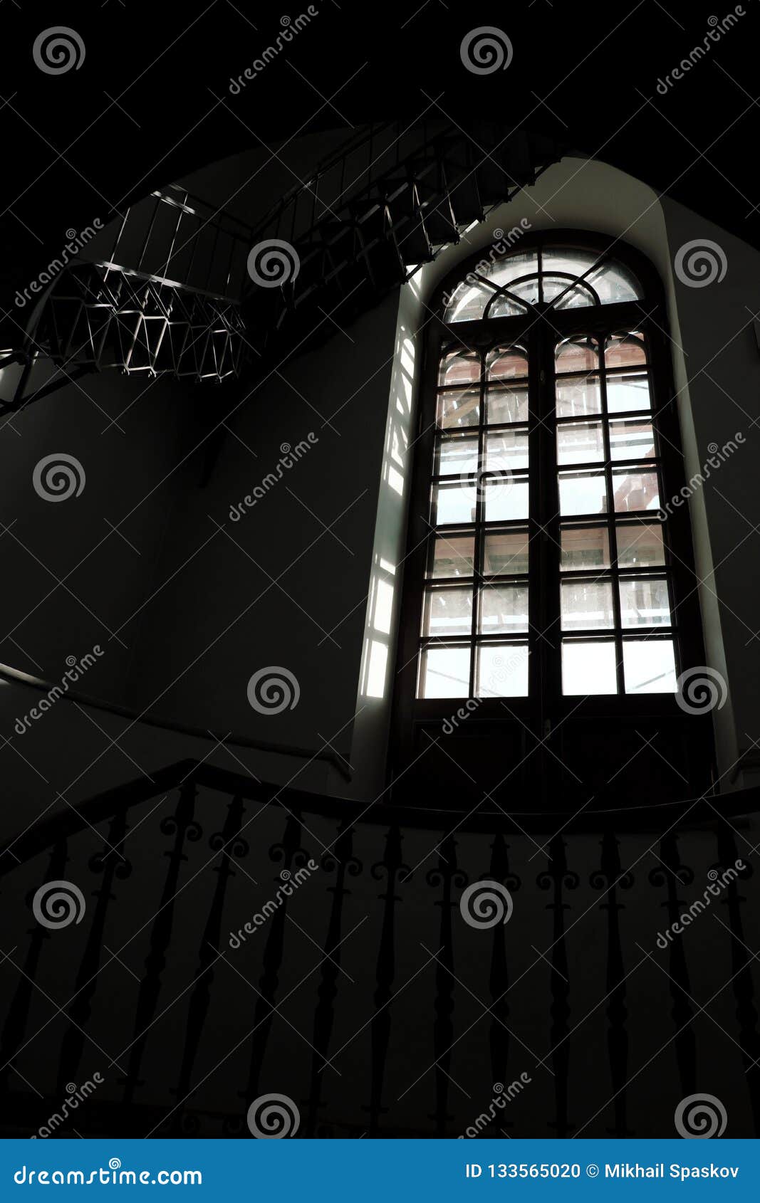 Circular Spiral Staircase in the Tower and a Tall Gothic Window. Stock ...
