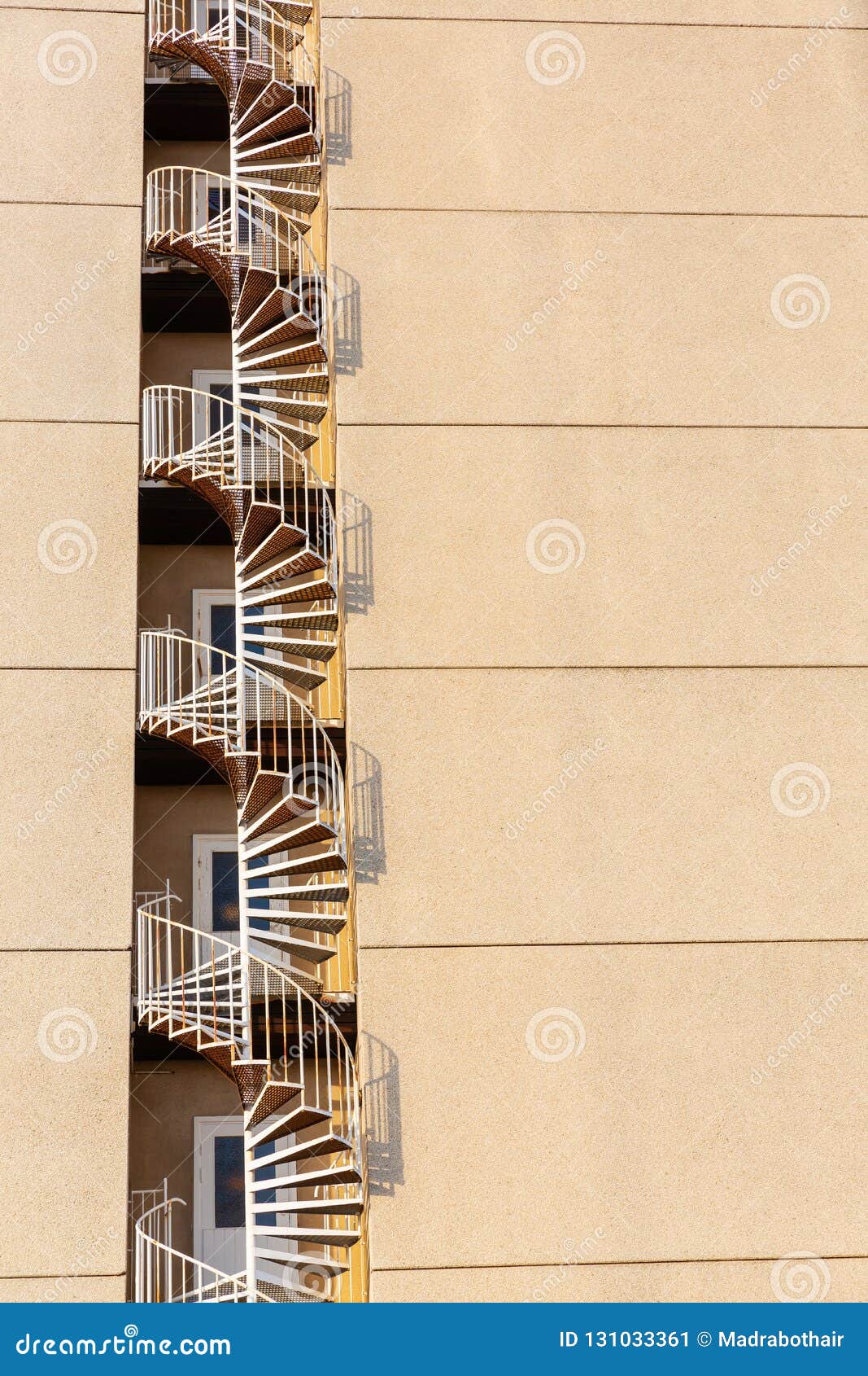 Circular Stairs at the Exterior Wall of a Building Stock Image - Image ...