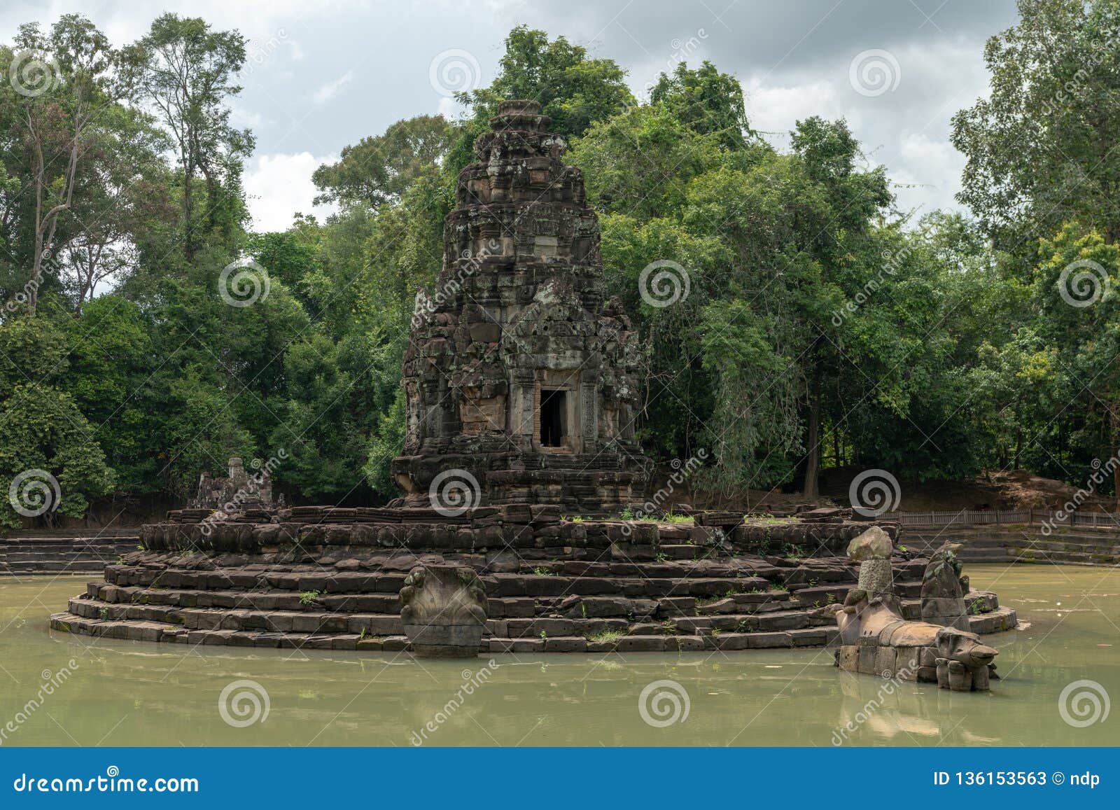 Circular Stone Monument with Doorway in Pond Stock Image - Image of ...
