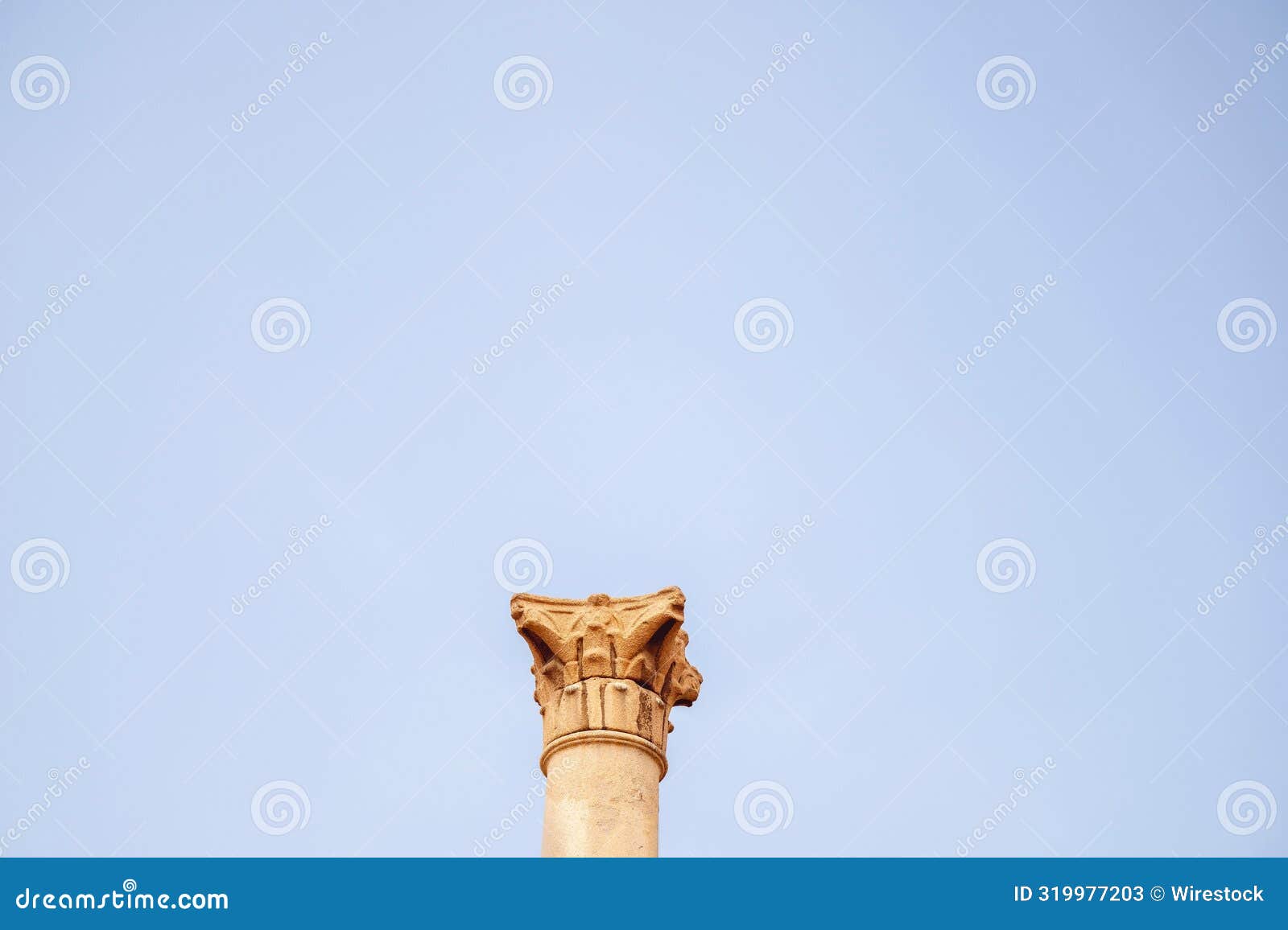 Circular Structure with a Pillar Under a Clear Blue Sky Stock Image ...