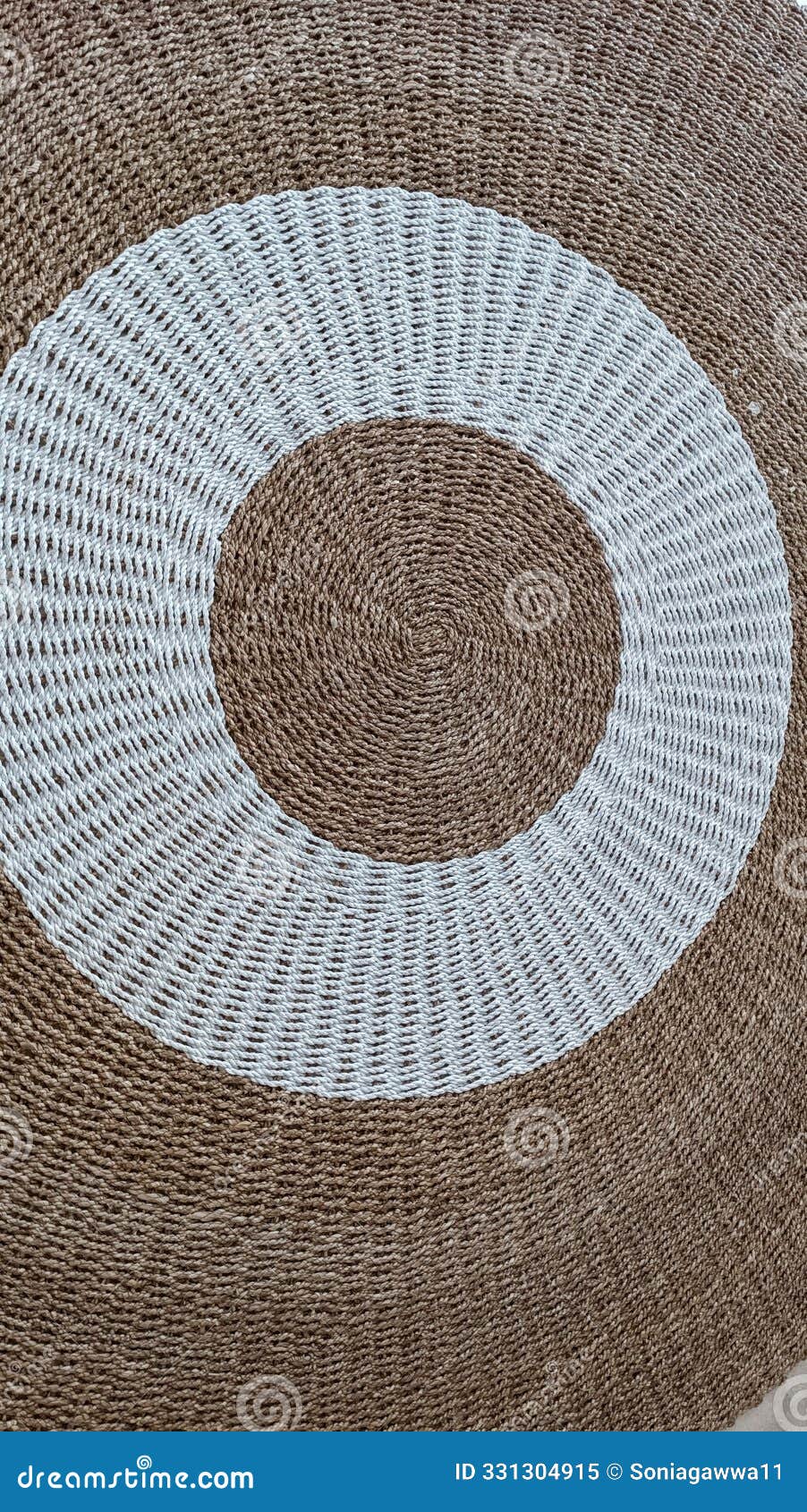 Circular Woven Mat with White Pattern on Wooden Floor Stock Image ...