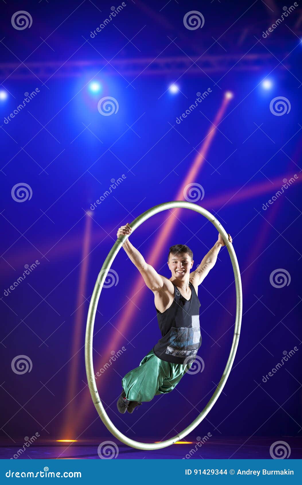 Circus Artist in a Cyr Wheel Stock Photo - Image of activity, cheerful ...