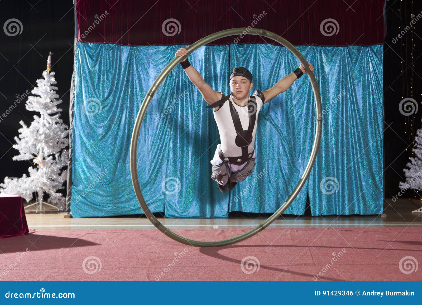 Circus Artist in a Cyr Wheel Stock Photo - Image of arena, gymnastics ...
