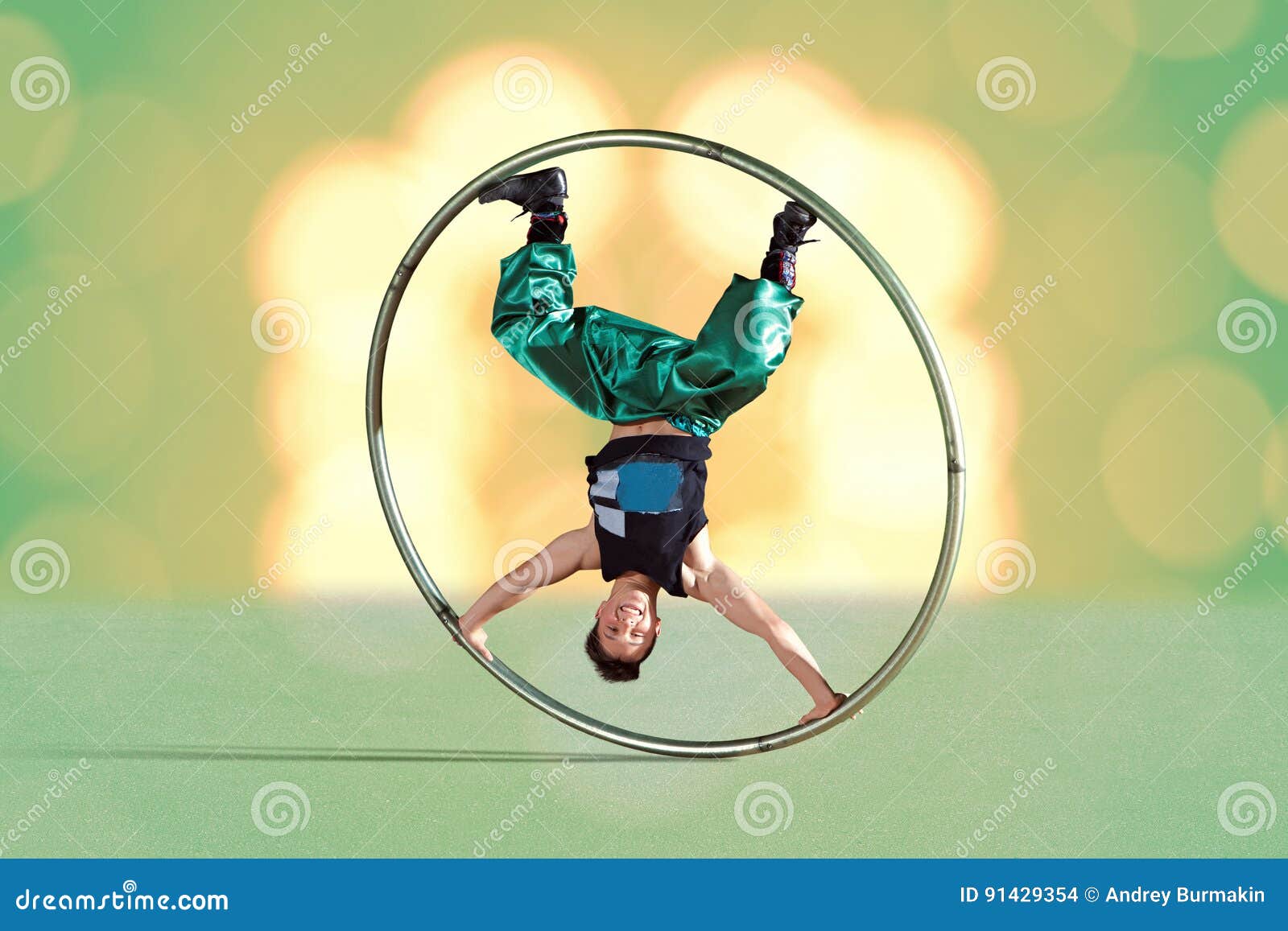 Circus Artist in a Cyr Wheel Stock Photo - Image of athlete, activity ...