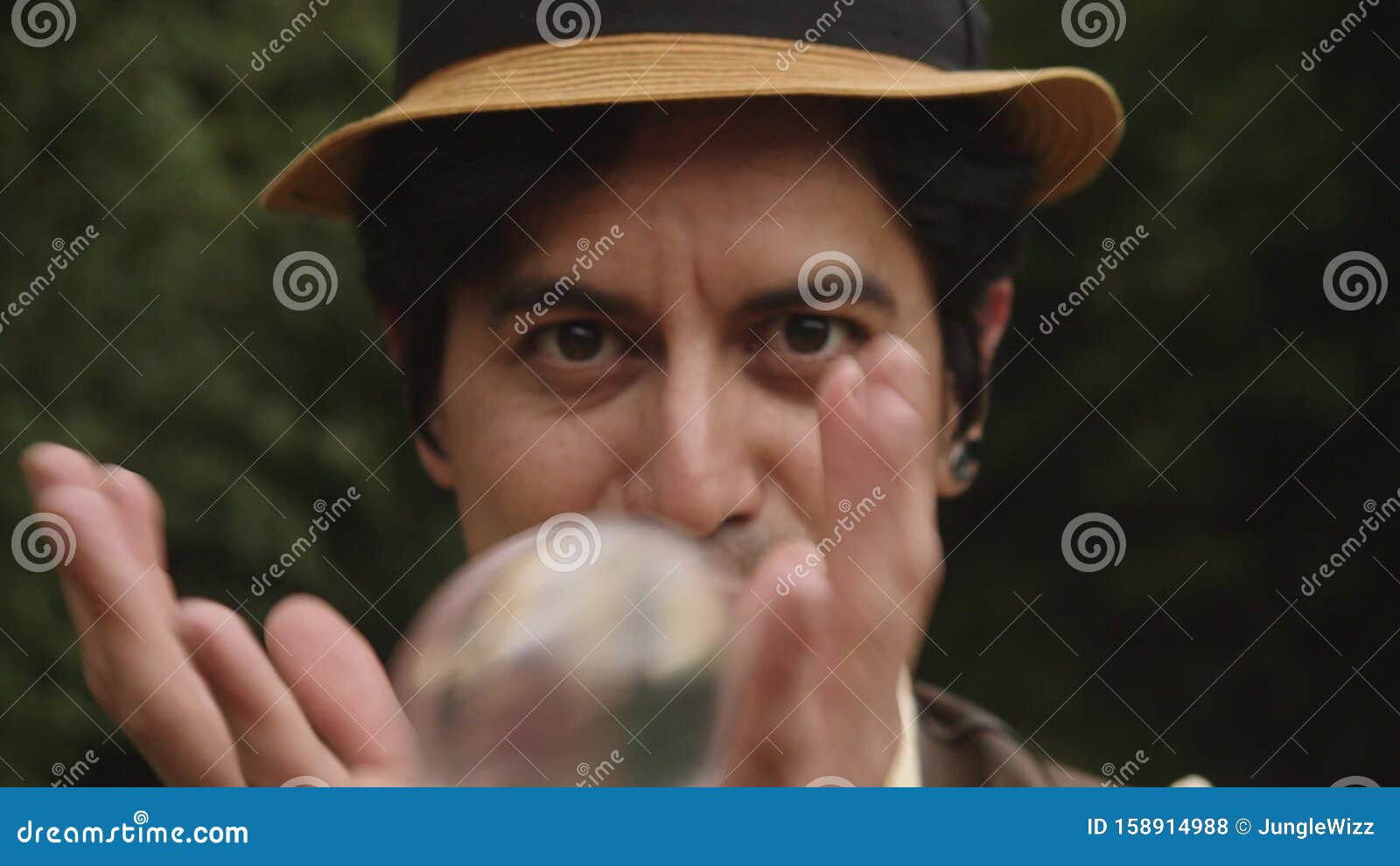 Circus Performer is Practicing a Trick Using a Crystal Ball Stock ...