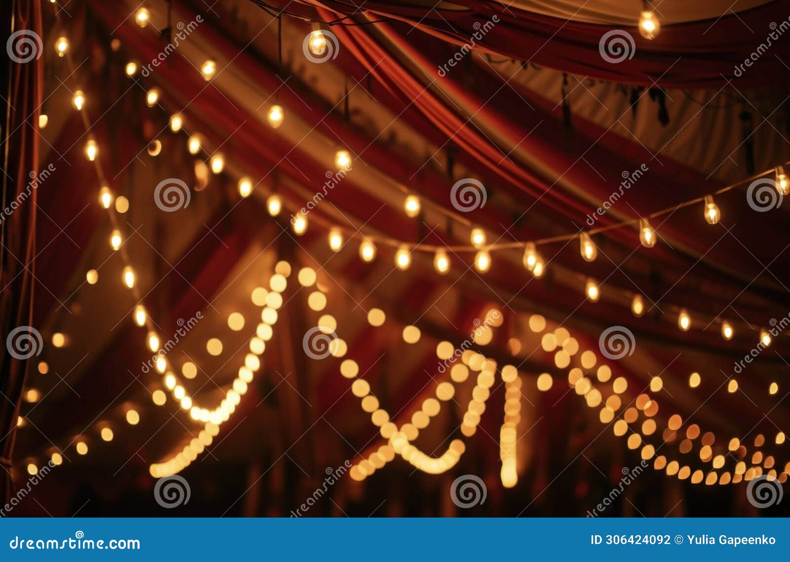 A Circus Tent with Glowing Lights in the Background Stock Photo - Image ...