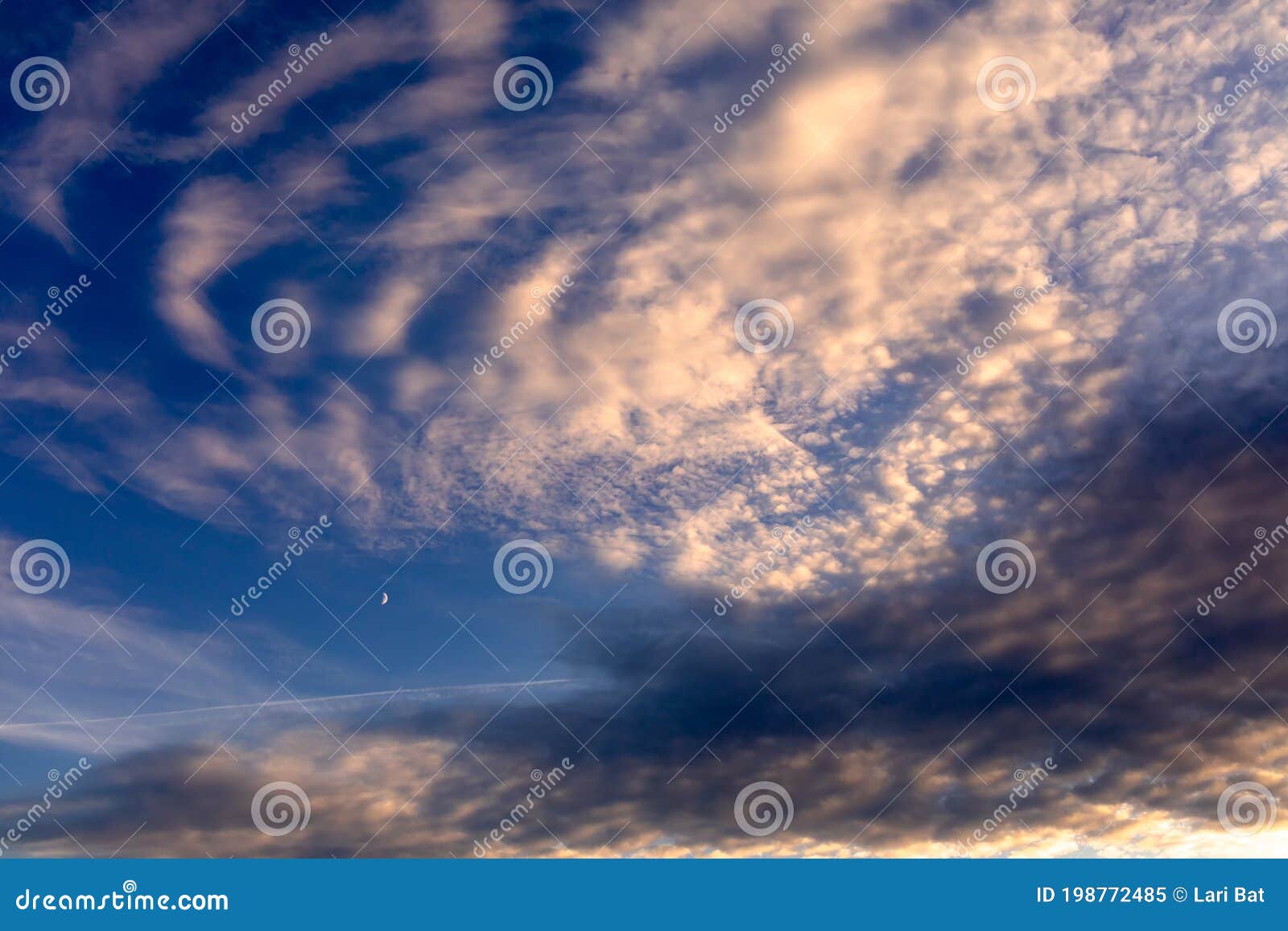 Cirrus Clouds at Sunset. the Wind Blows Up the Clouds, You Can See a ...