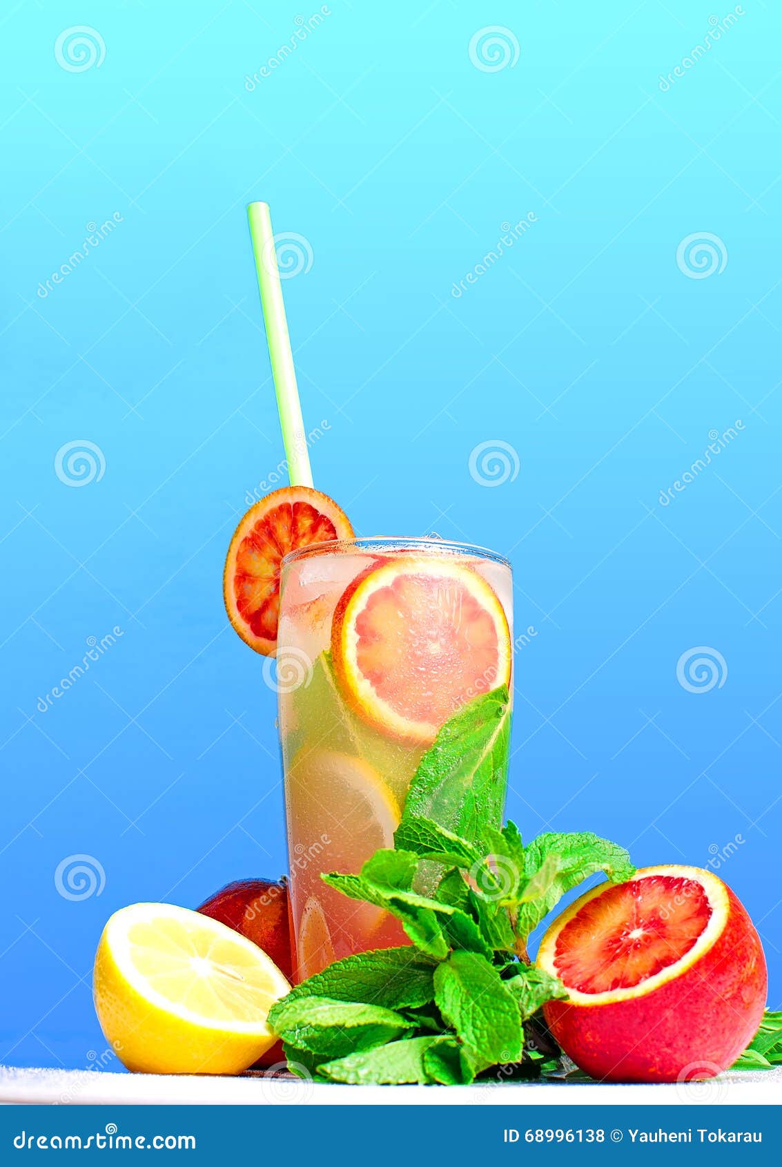Citrus Cold Lemonade on a Blue Background Stock Photo - Image of ...