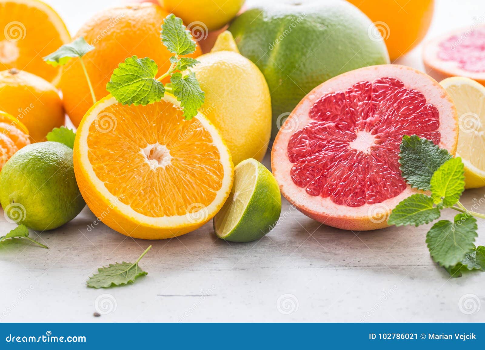 Citrus Fresh Fruit. Orange Grapefruit Lemon Lime with Mint Leave Stock ...