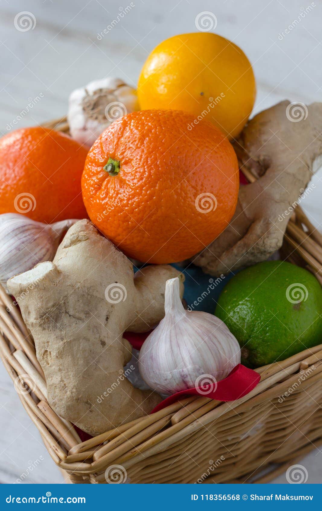 Citrus Fruits, Garlic and Ginger Root on Basket. Stock Photo - Image of ...