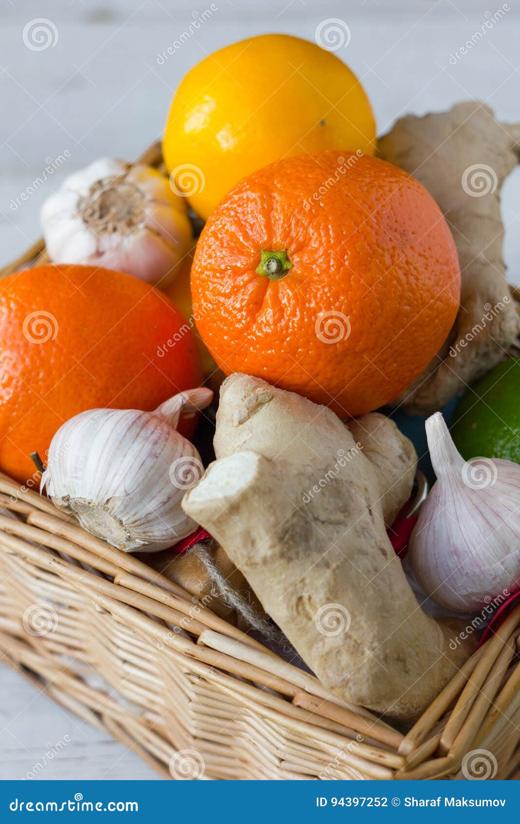 Citrus Fruits, Garlic and Ginger Root on Basket. Stock Photo - Image of ...